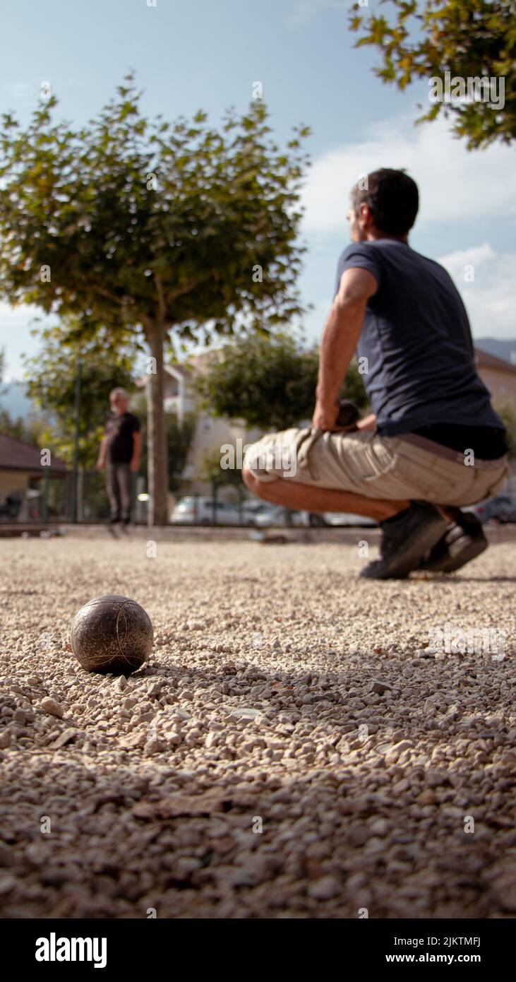 A Petanque France game-Man playing petanque Stock Photo - Alamy