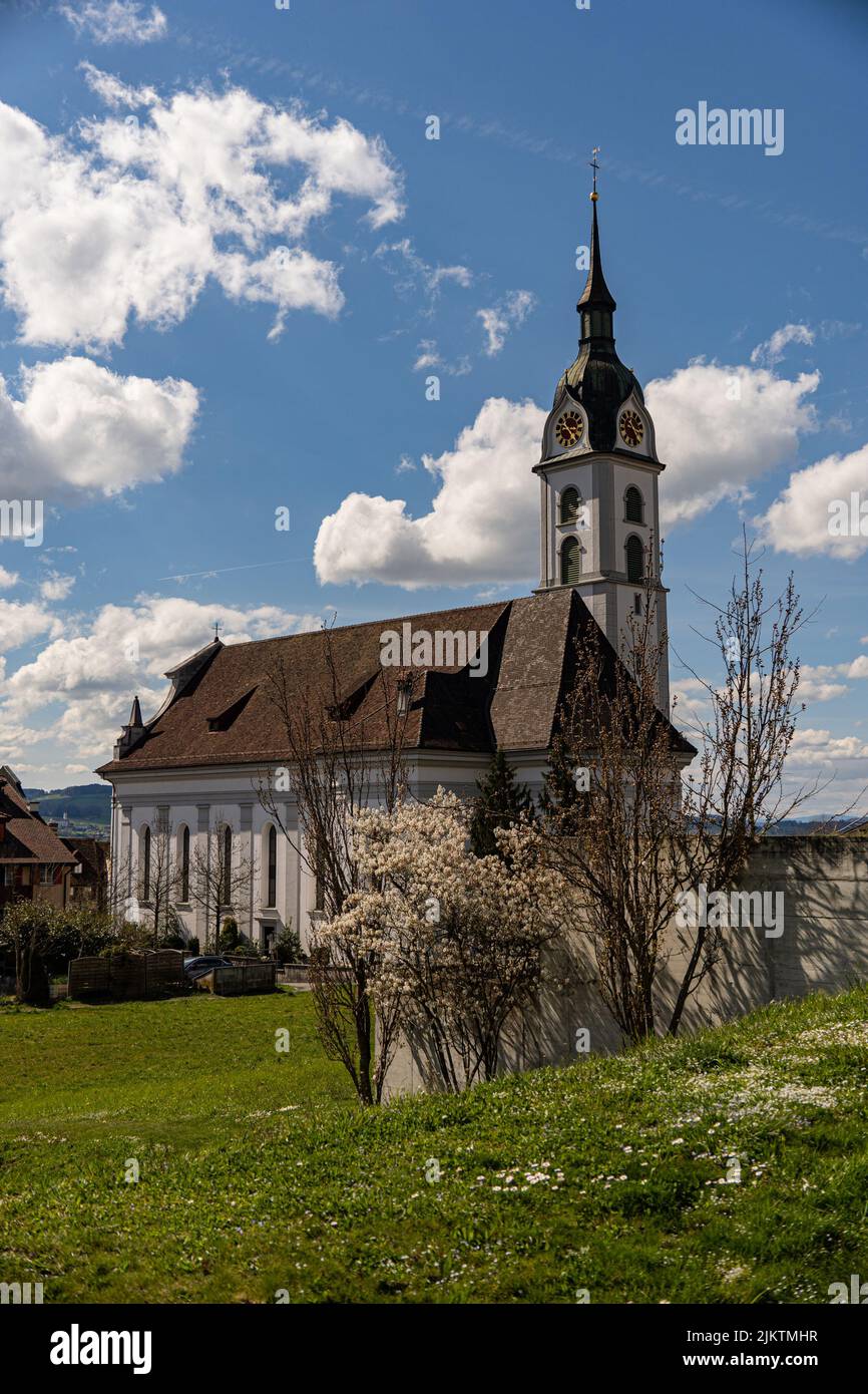 A vertical shot of the old church under the blue cloudy sky Stock Photo ...
