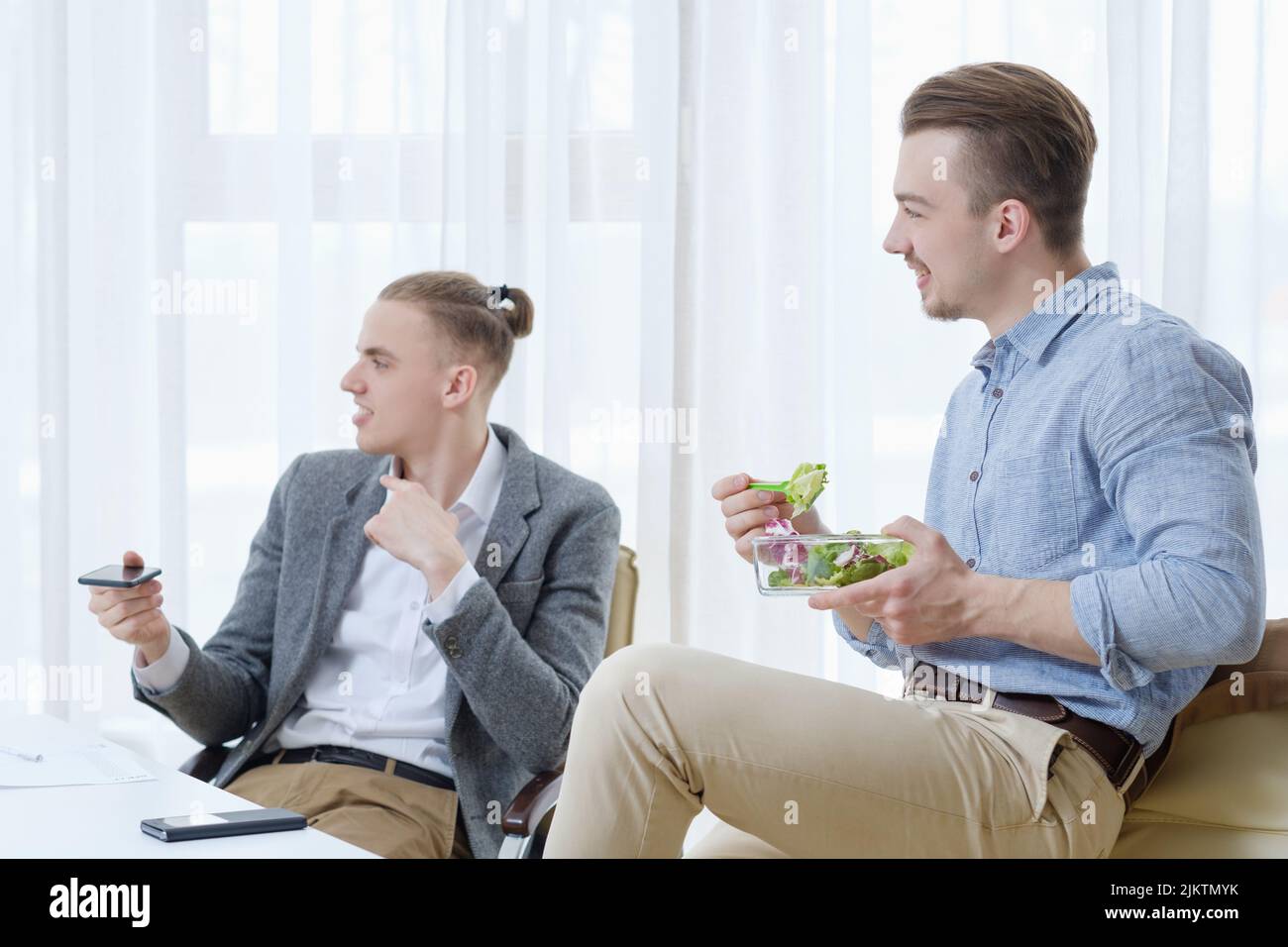 office communication business men talking lunch Stock Photo - Alamy