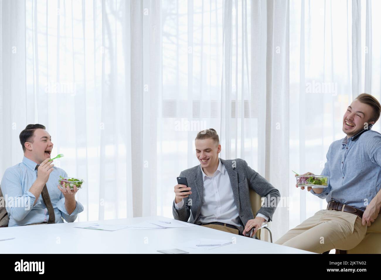 office communication business men laughing lunch Stock Photo - Alamy