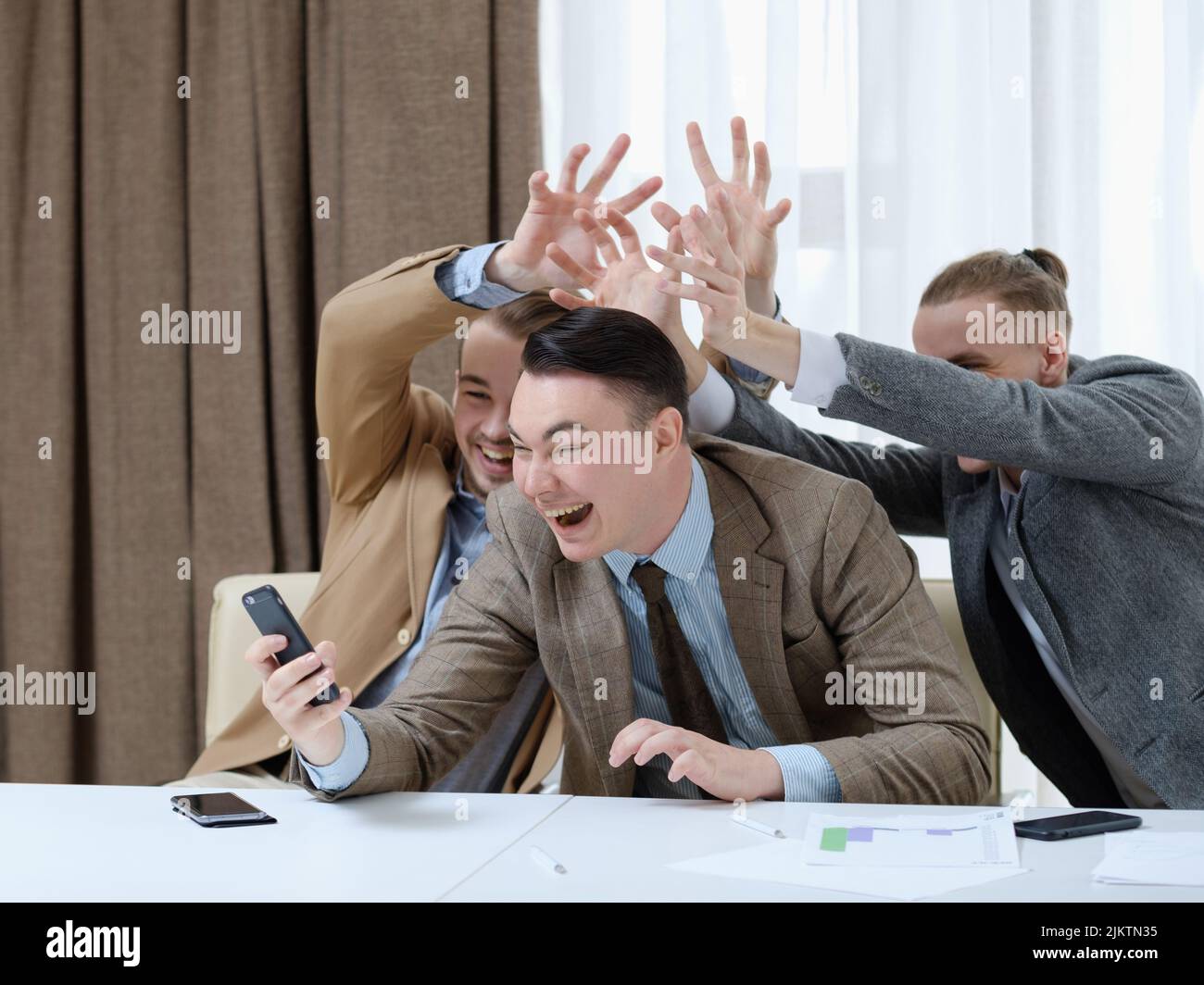 fun work happy laughing business men take photo Stock Photo - Alamy