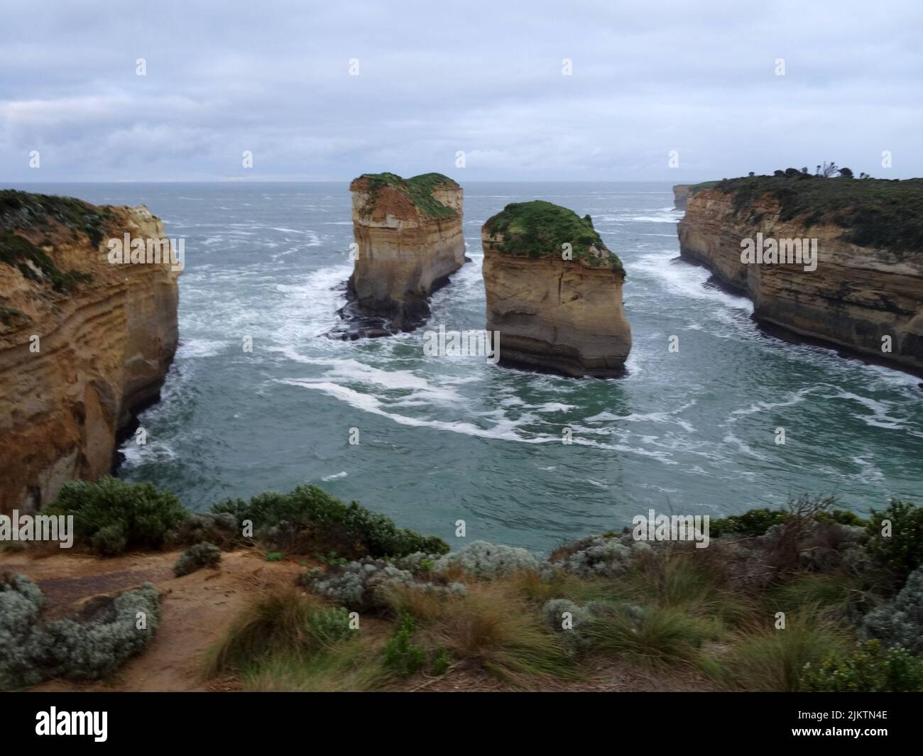 A scenery of the Twelve Apostles limestone stacks on the coast by the ...