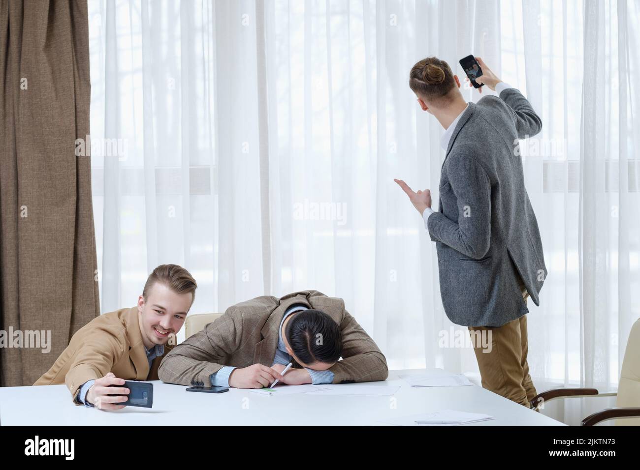 office fun work business selfie sleeping colleague Stock Photo - Alamy
