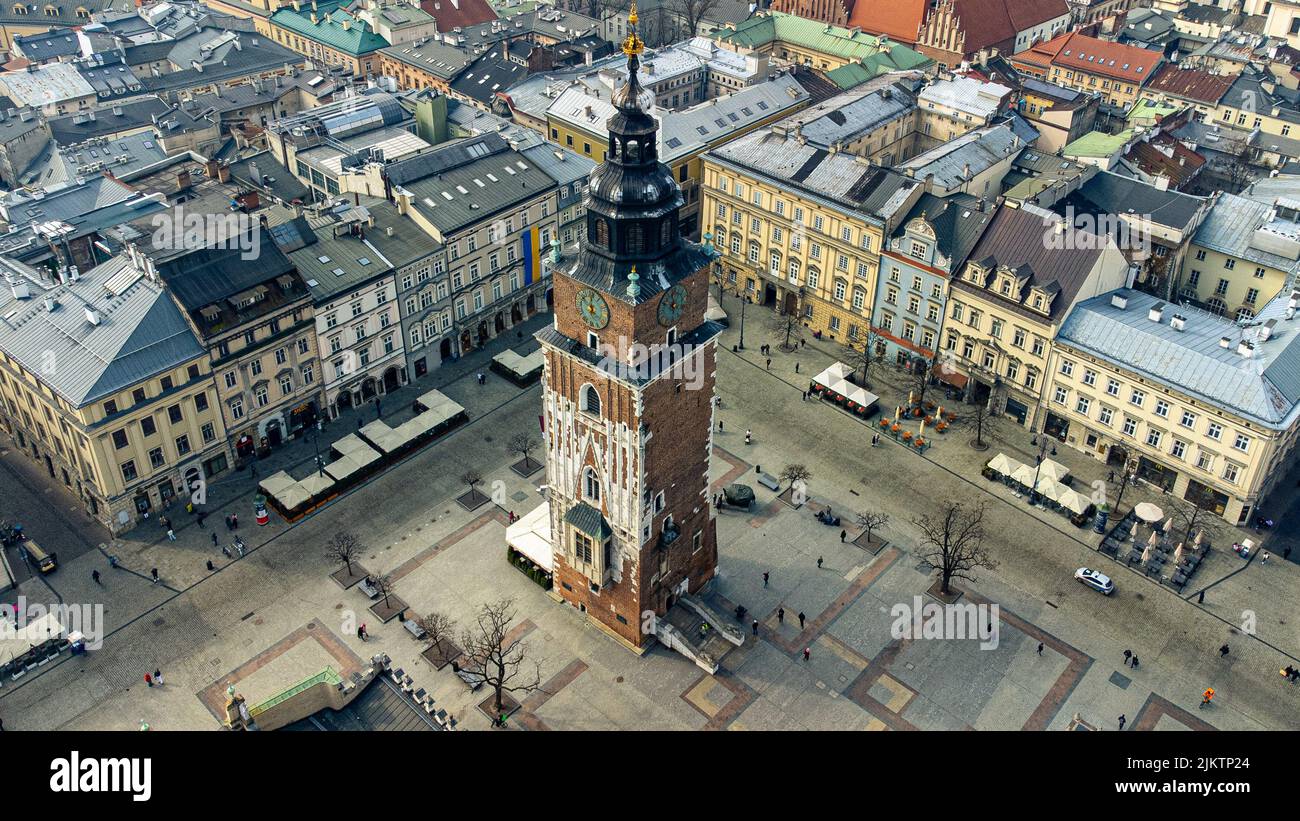 A scenic shot of the famous Town Hall Tower surrounded by city ...
