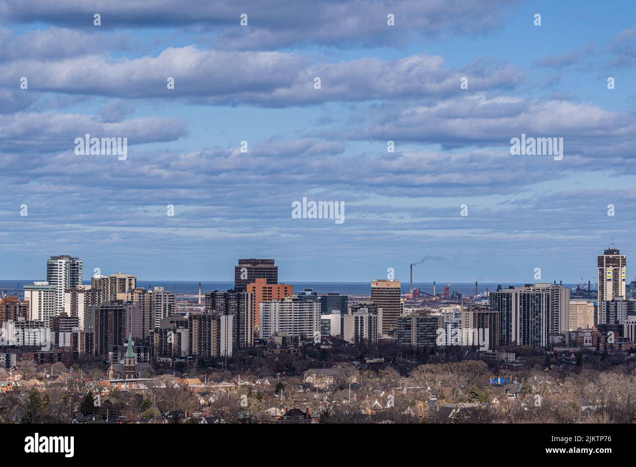 The buildings in Hamilton against the background of sea and sky ...