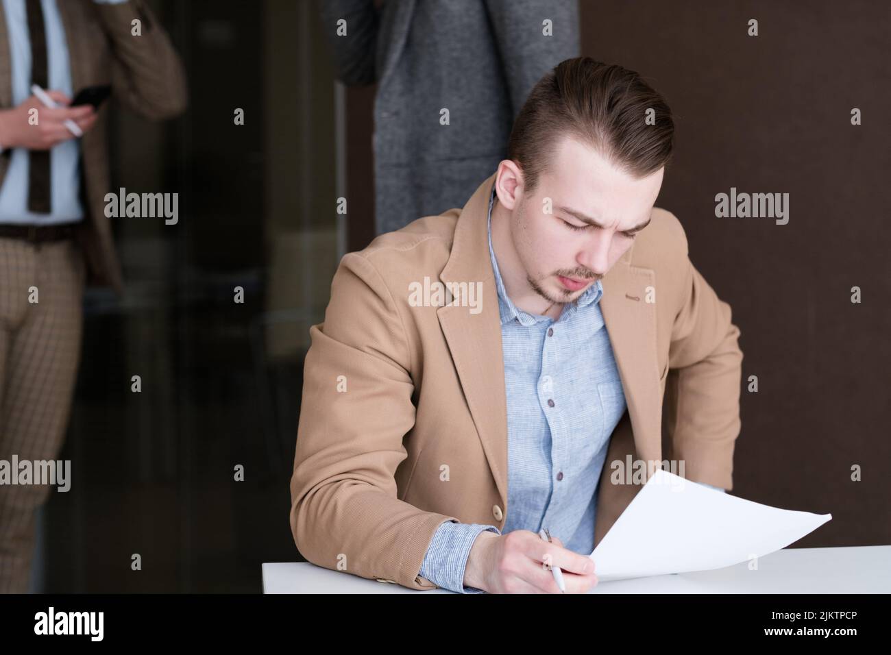 Executive business people reading documents hi-res stock photography ...