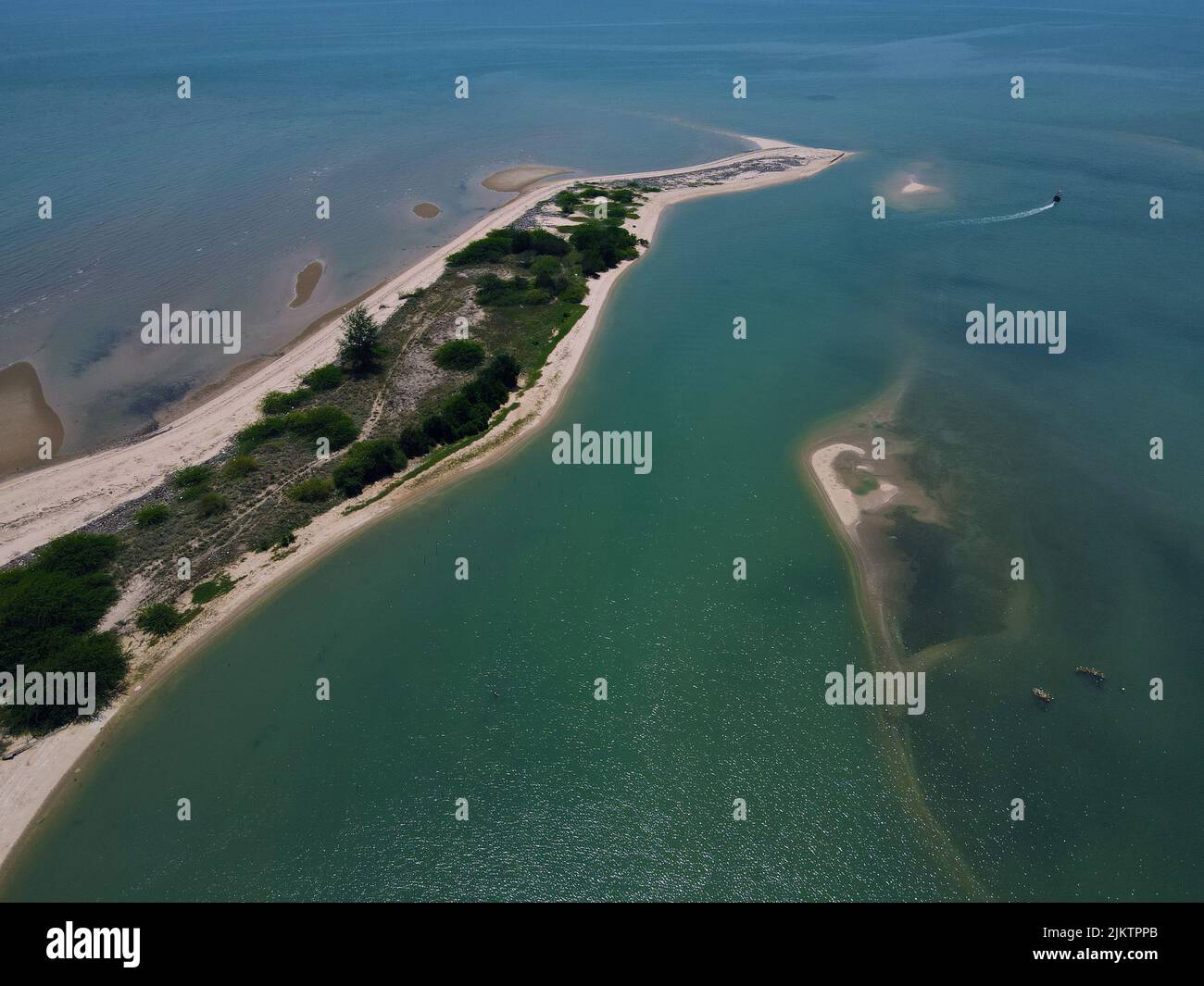 An aerial view of the beautiful blue oceans surrounding the Chaiya ...