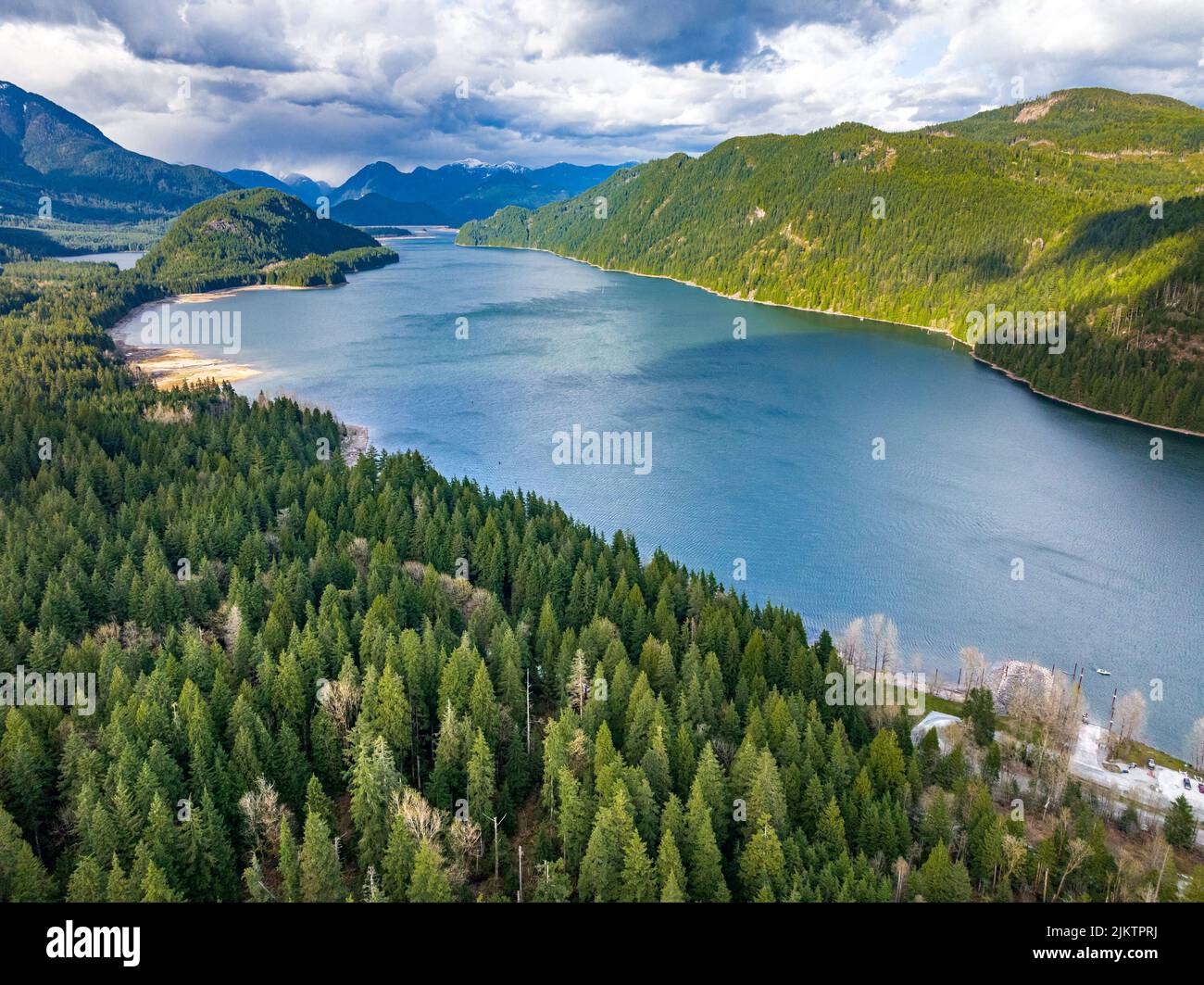 An aerial shot of a lake Stave surrounded by wild landscape in the ...