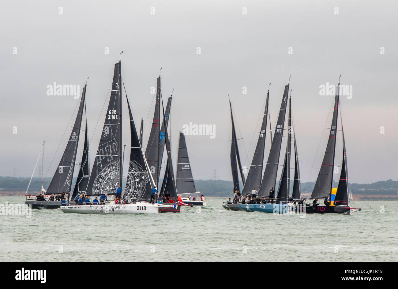 yachts racing in the solent off the coast of the isle of wight during ...