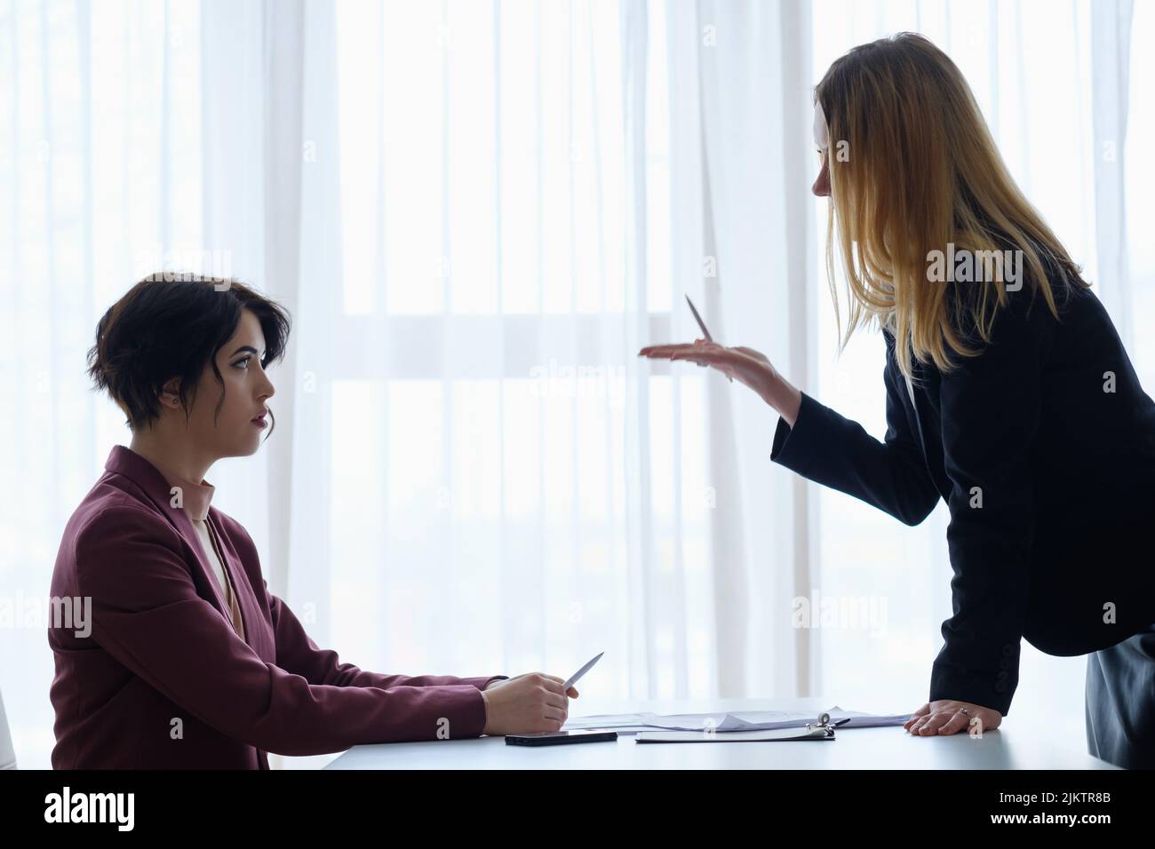 boss reproach employee business woman reproof Stock Photo - Alamy