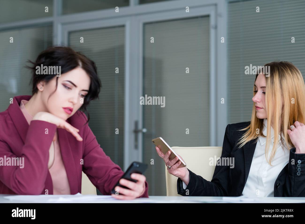 bored business women meeting waiting idler work Stock Photo - Alamy