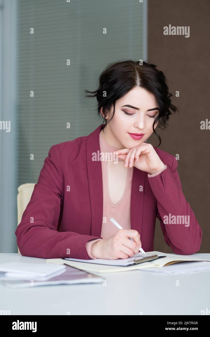 Serious busy young manager hi-res stock photography and images - Alamy