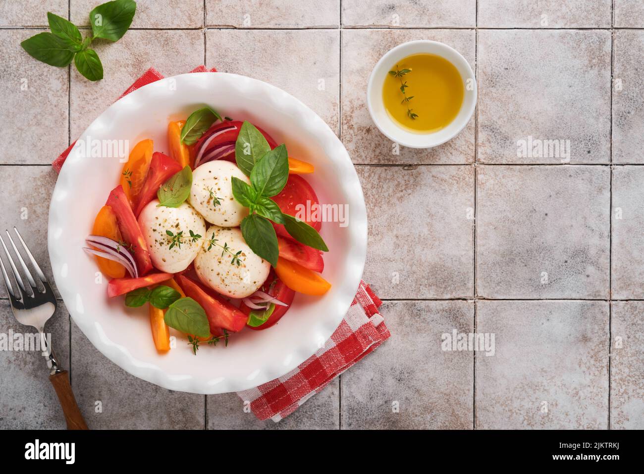 Caprese salad. Italian caprese salad with sliced tomatoes, mozzarella ...