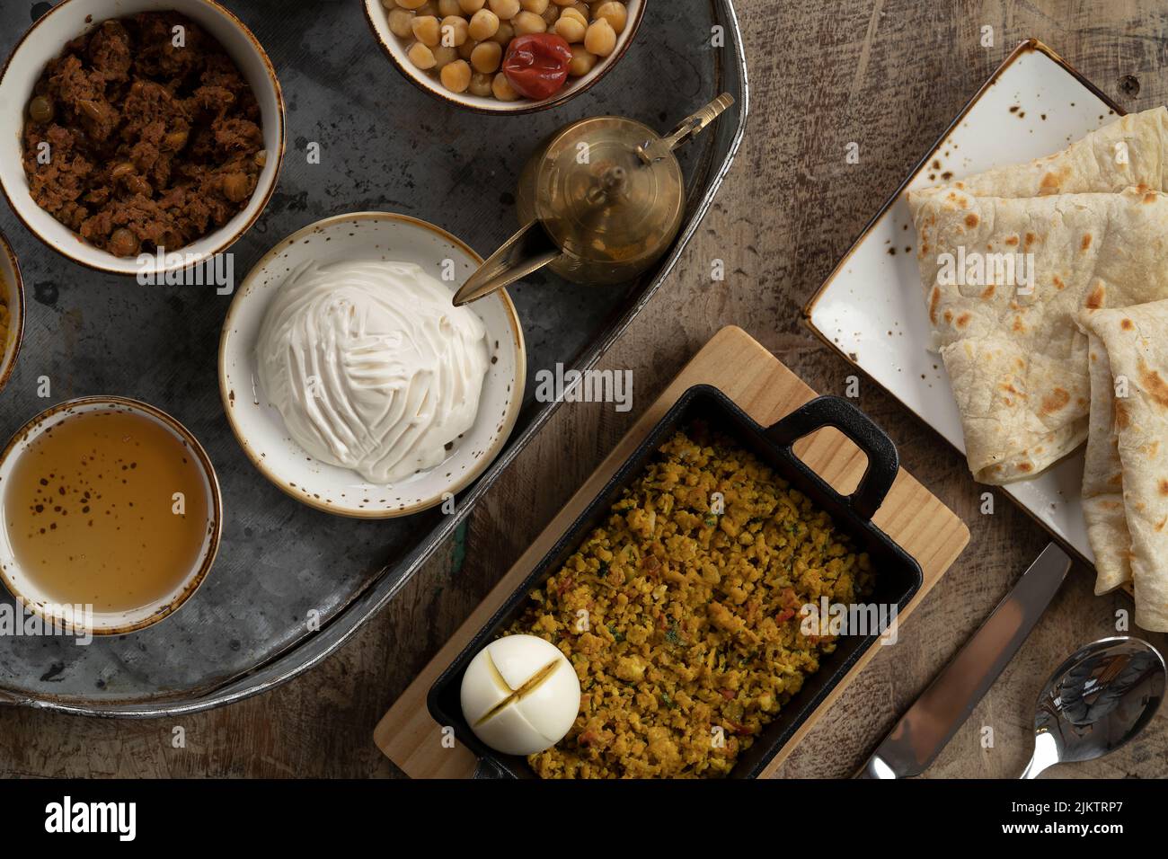 A top view with different traditional Emirati food served at the ...