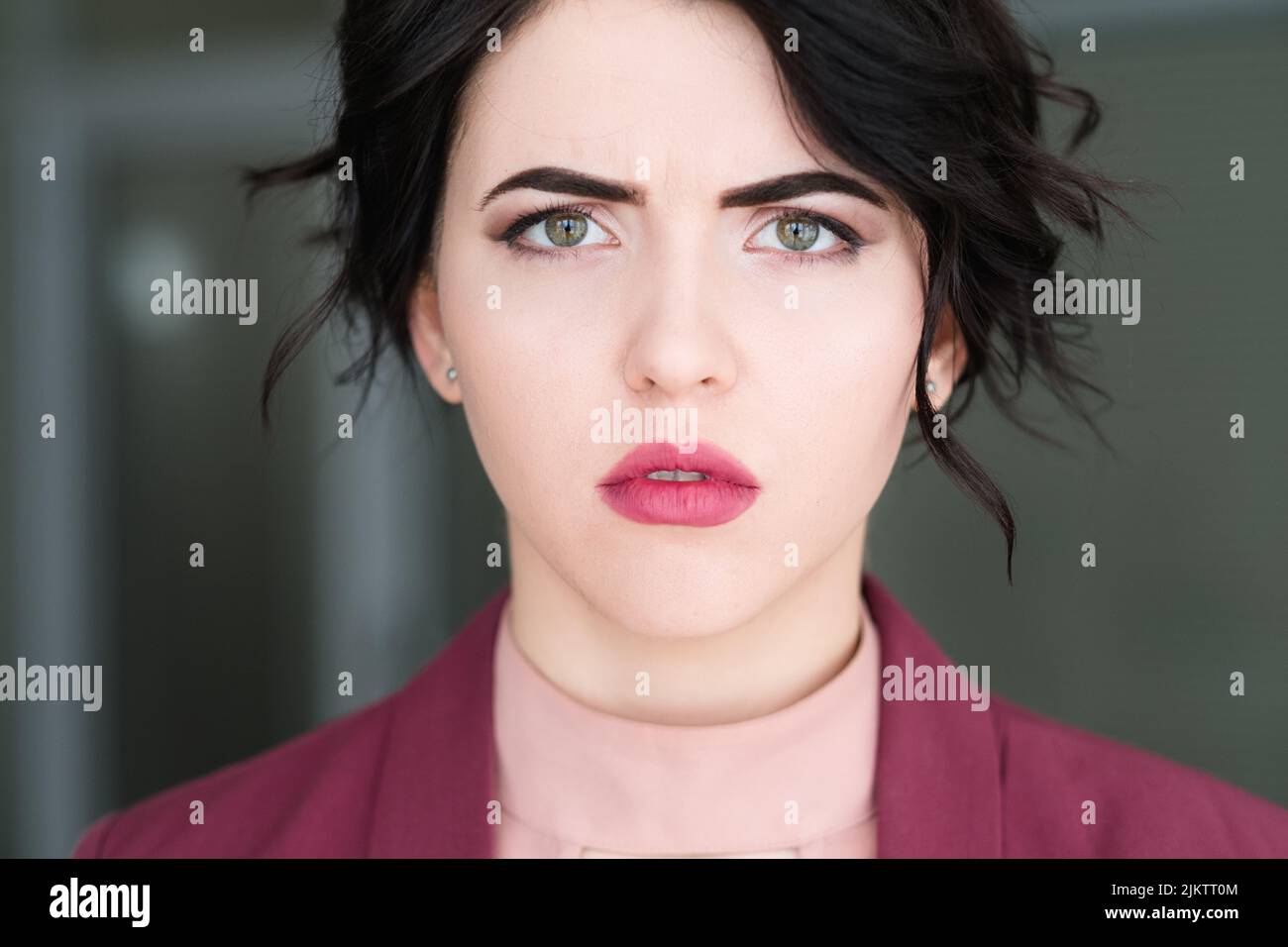 emotion face sad upset serious sullen woman Stock Photo - Alamy