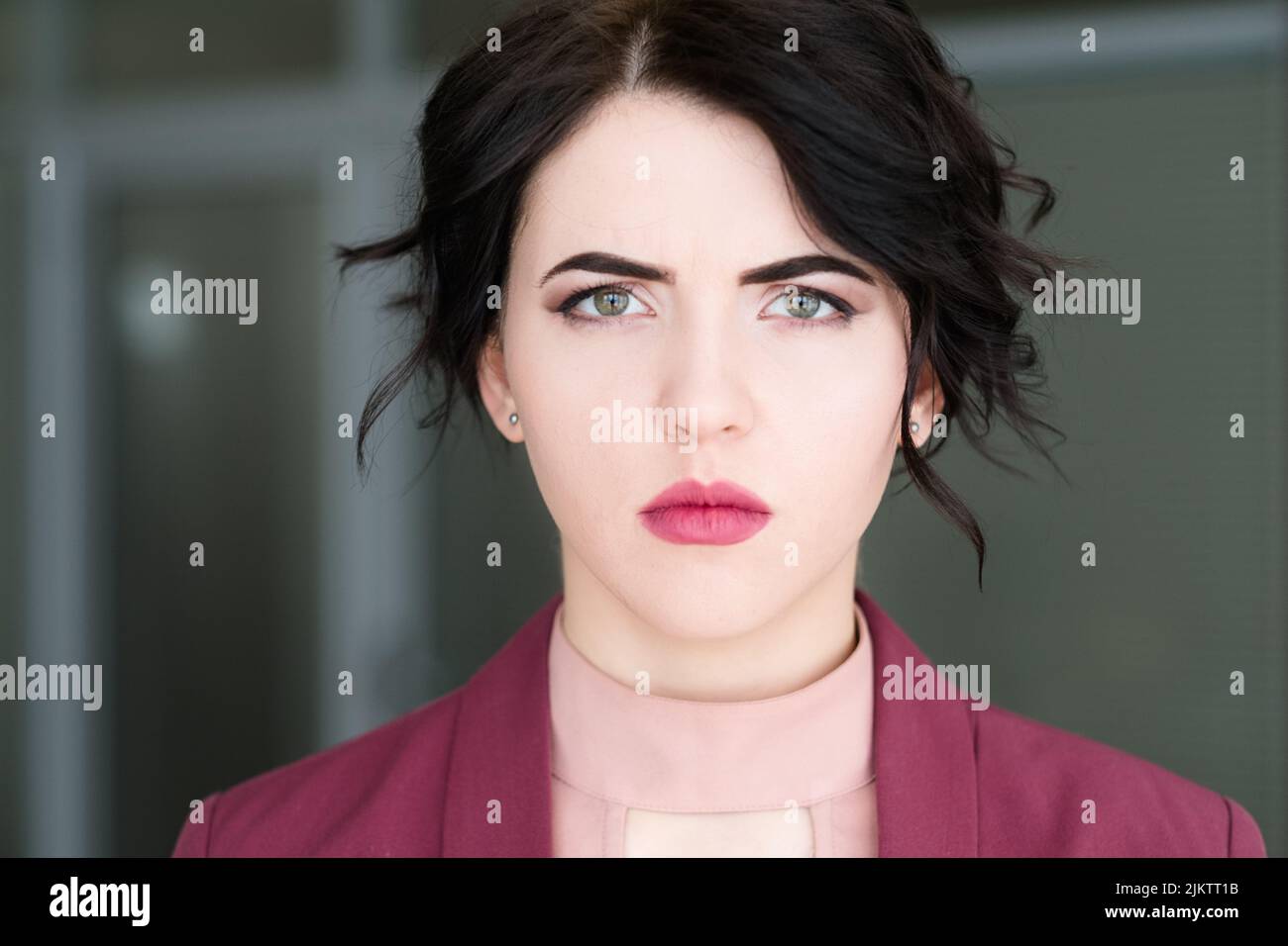 emotion face sad upset serious sullen woman Stock Photo - Alamy