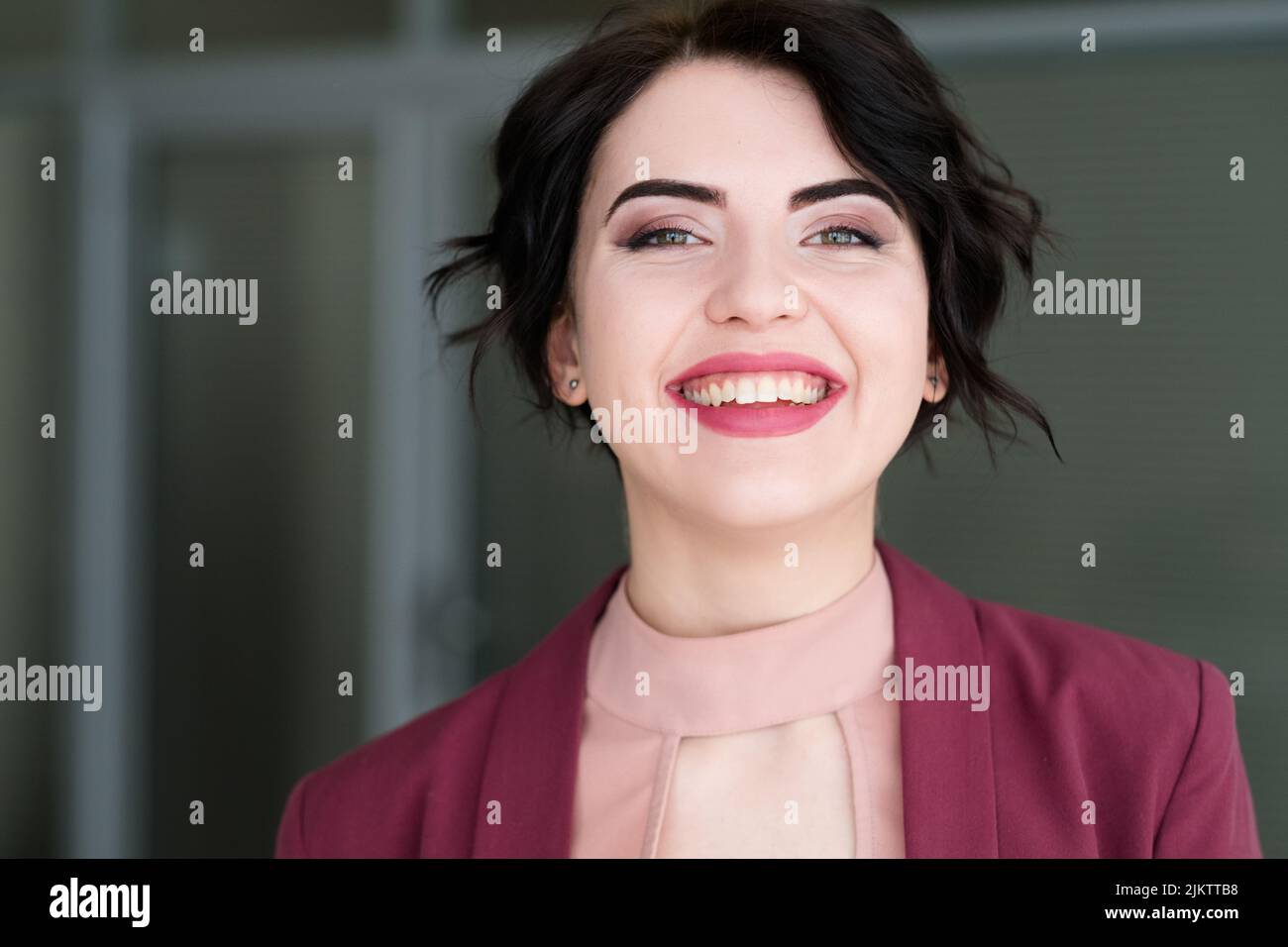 emotion face happy smiling cheerful pleased woman Stock Photo - Alamy