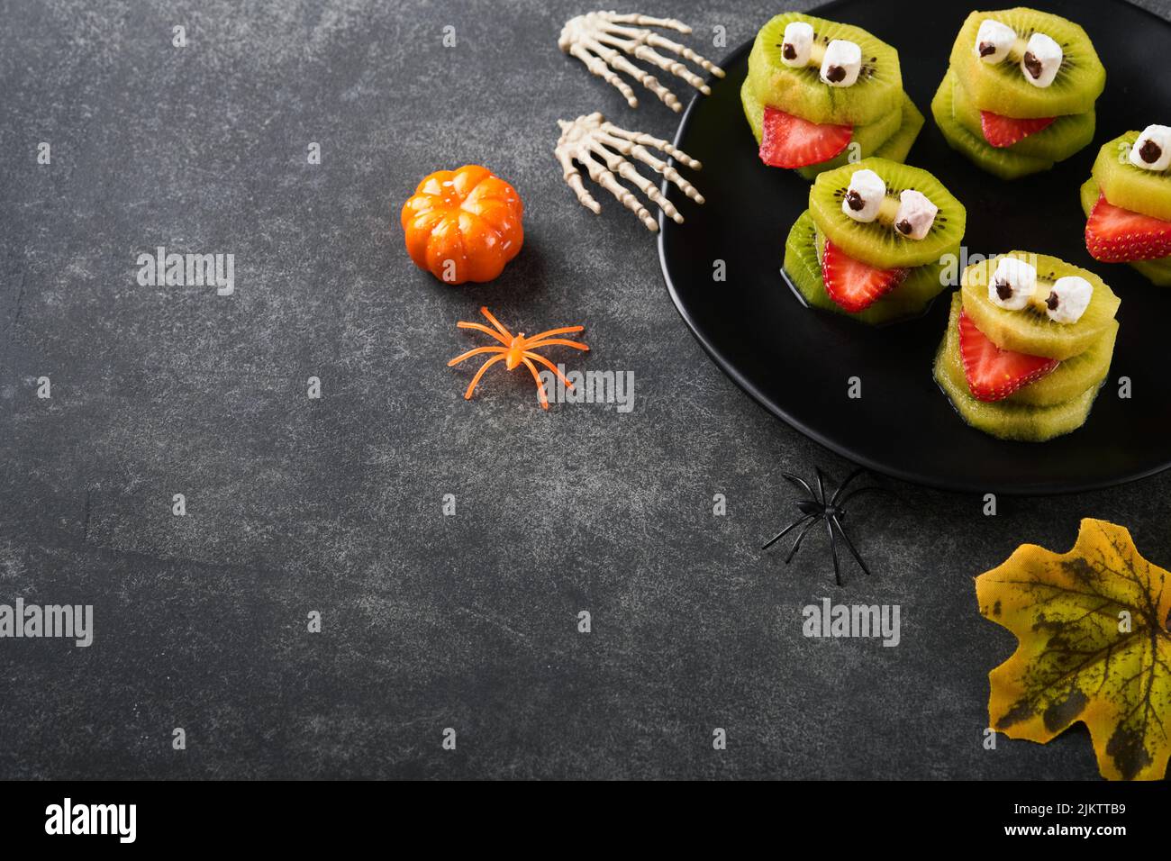Spooky green kiwi monsters for Halloween. Healthy Fruit Halloween ...
