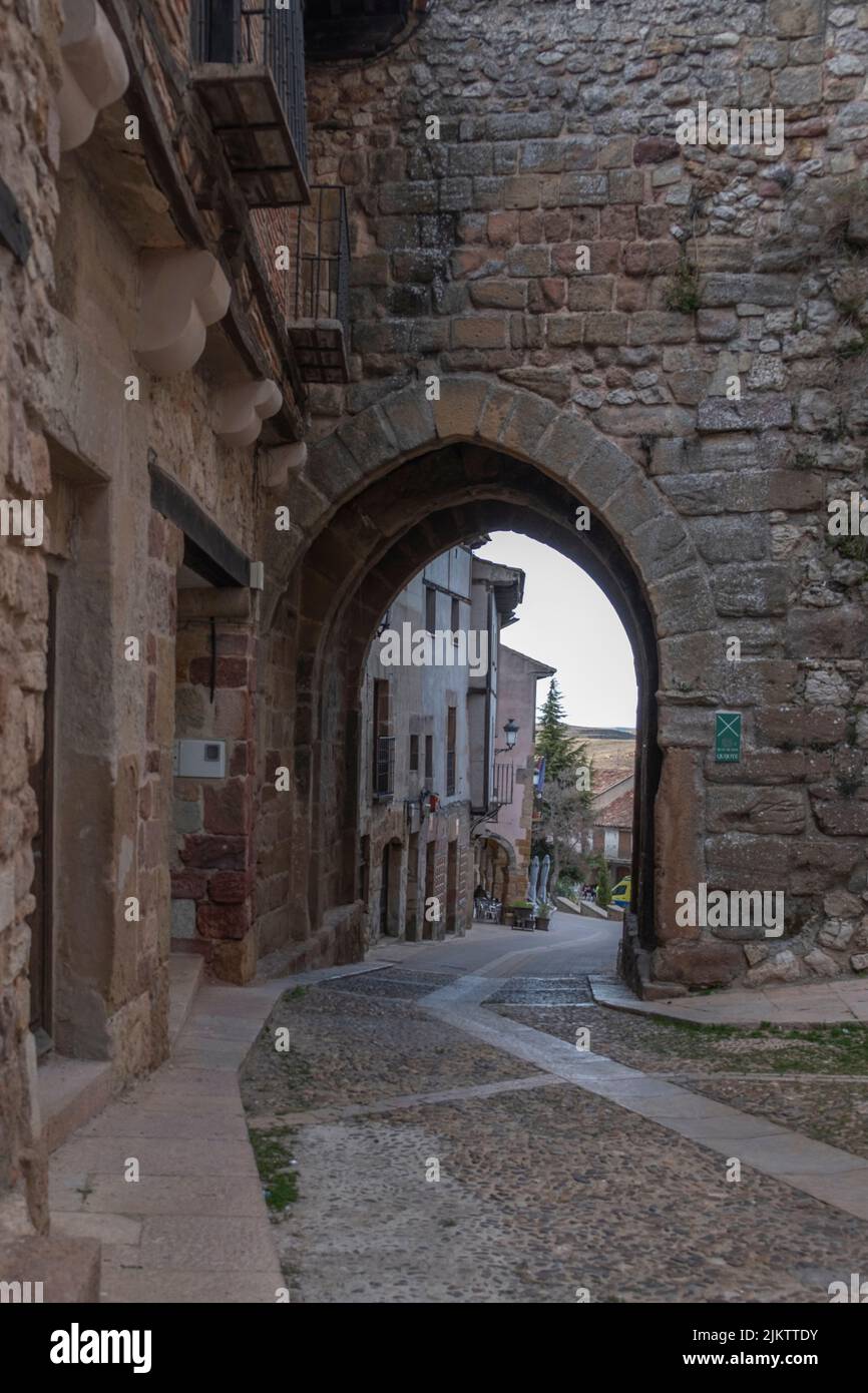 A vertical shot of an arched passageway in the Castle of Atienza in ...
