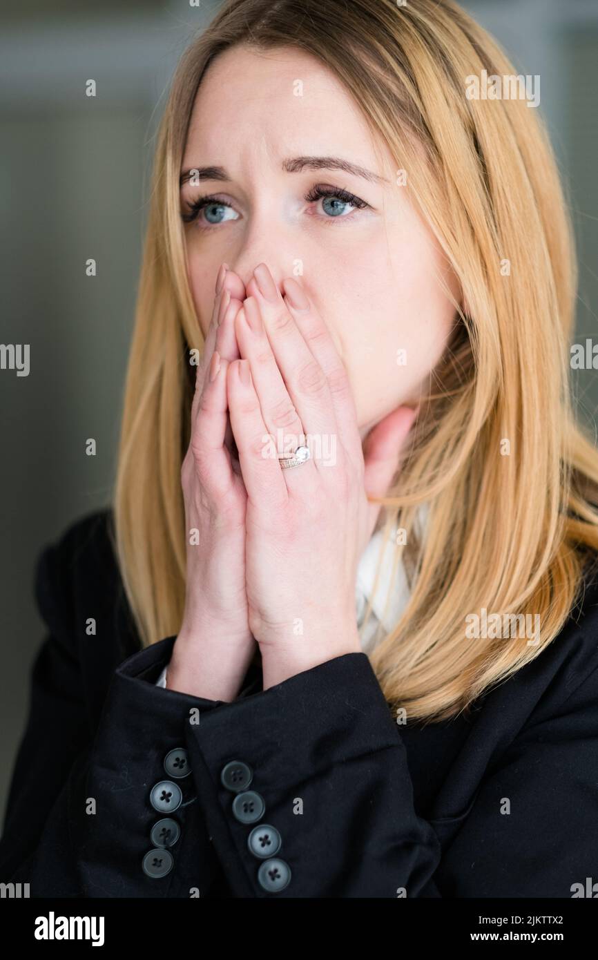 emotion bad news anxiety worry dismay stress woman Stock Photo - Alamy