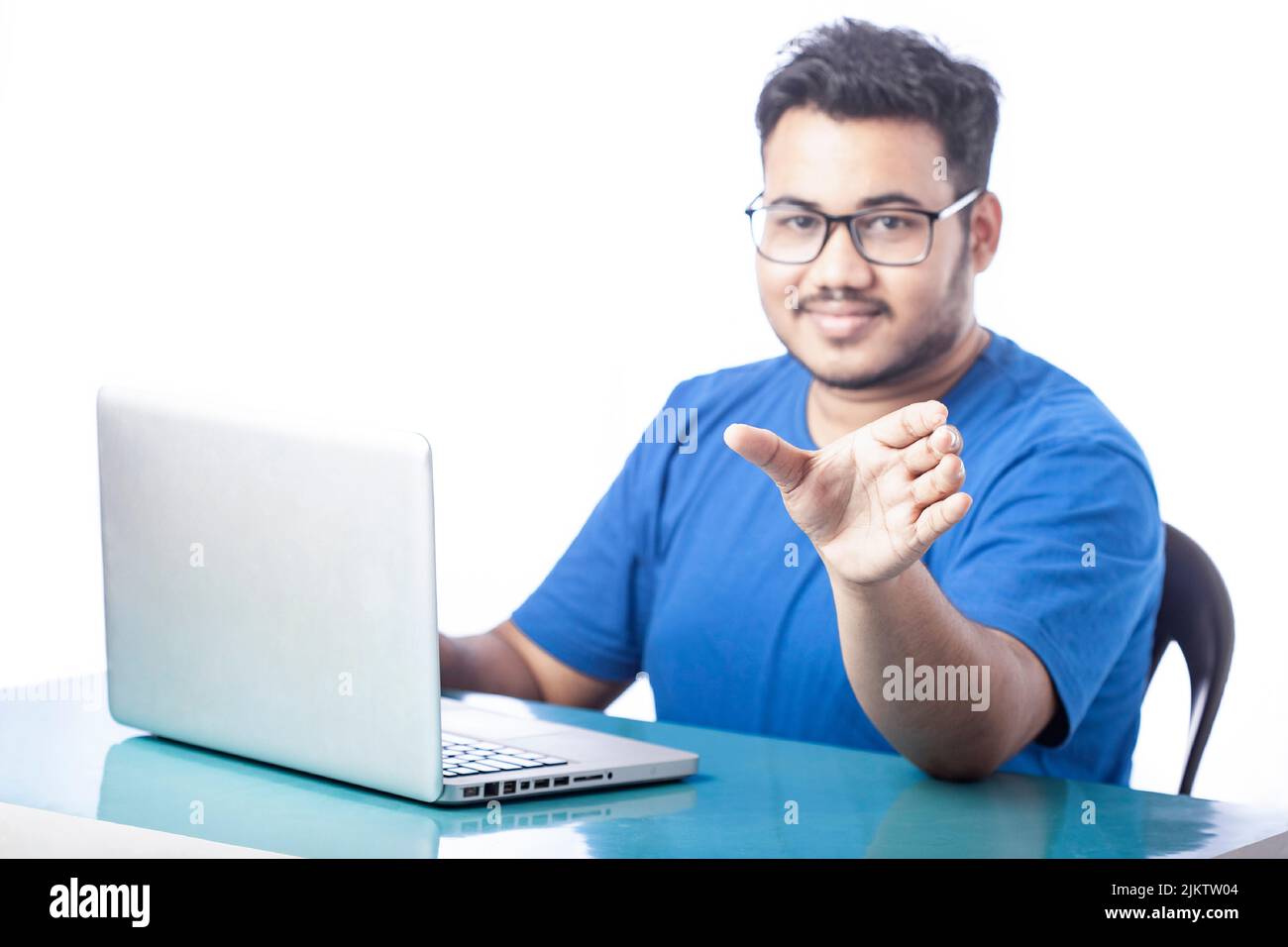 smiling man demonstrate something on his empty palm for product Stock ...