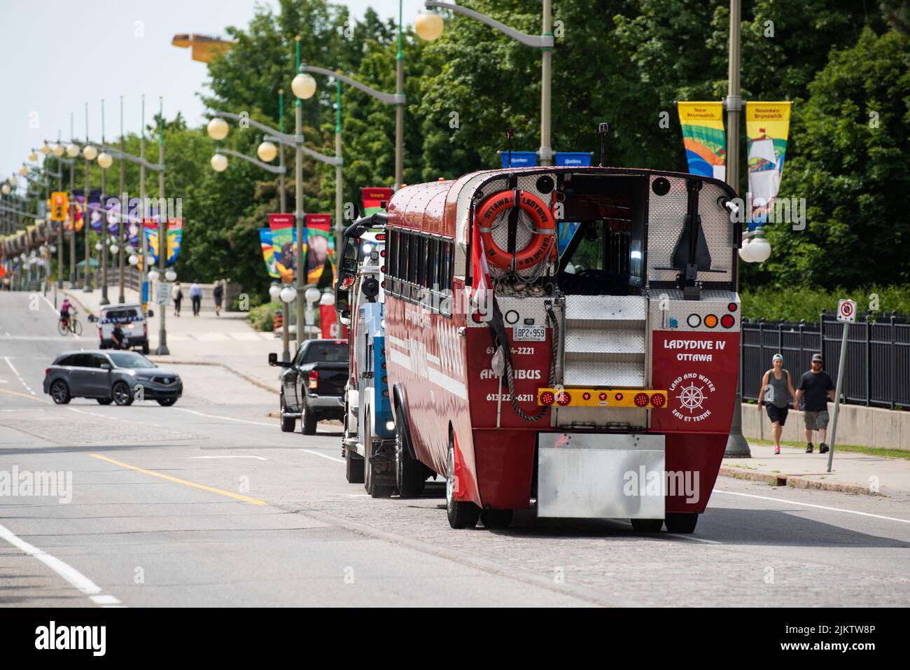A towing company tows away an amphibious Lady Dive Tour vehicle after ...