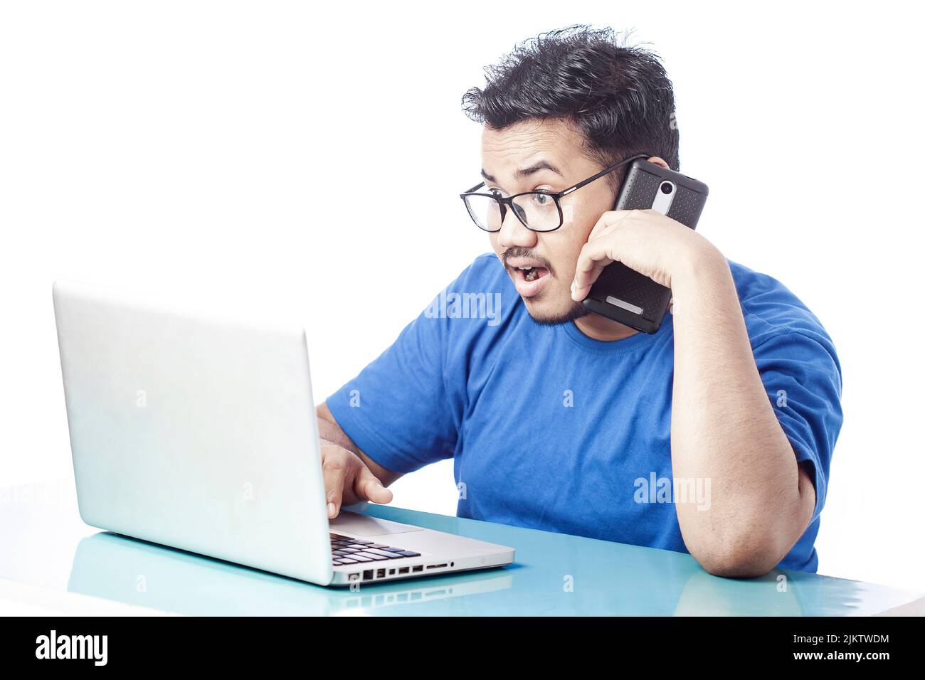 Person looking over computer screen hi-res stock photography and images ...