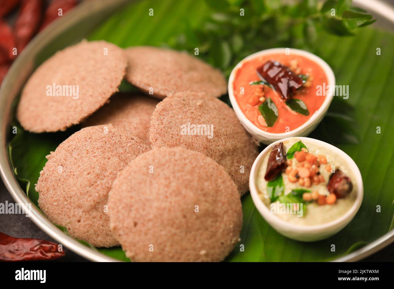 south indian breakfast idly served with two chutne Stock Photo - Alamy