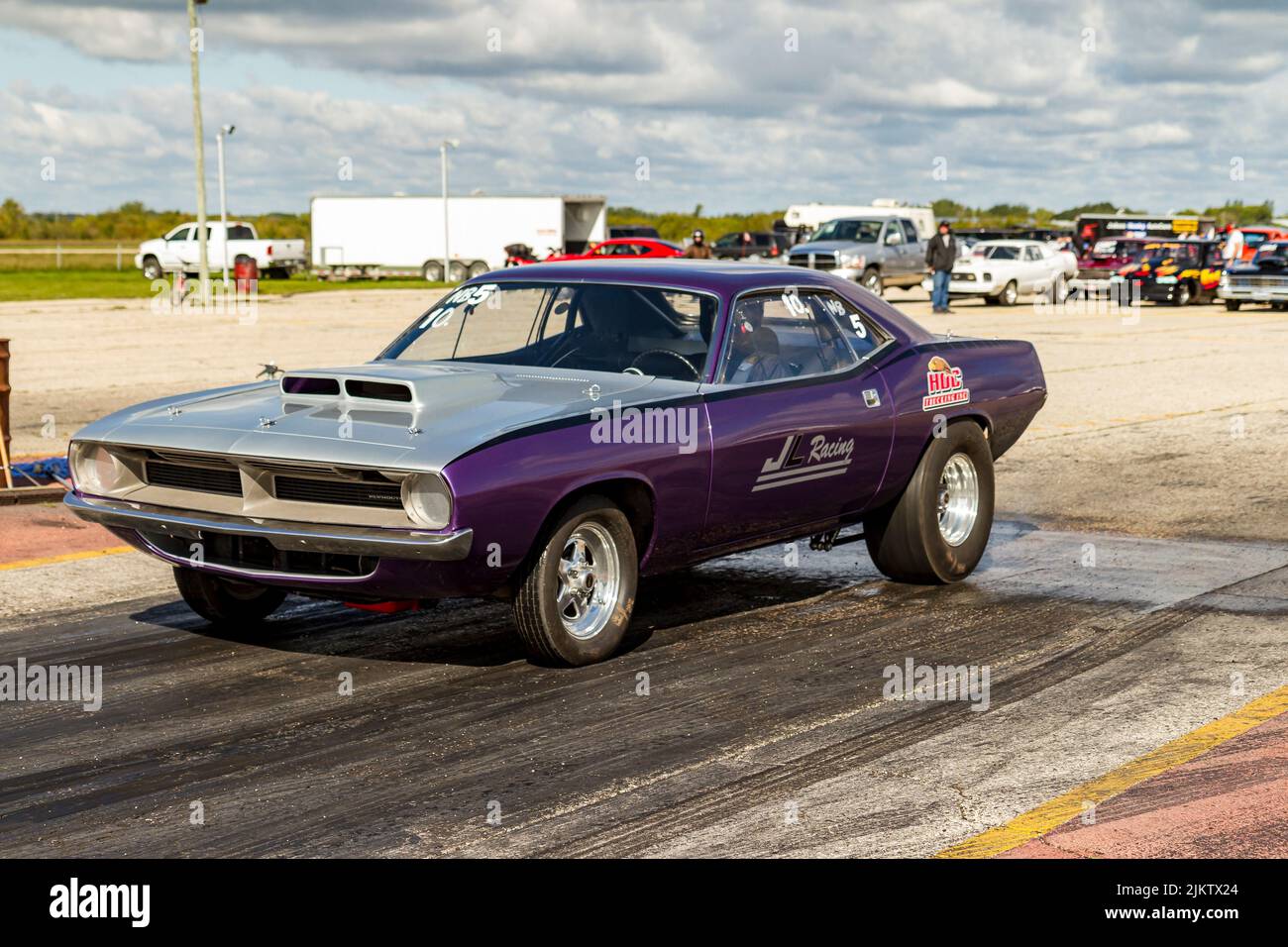 Car warm up with smoke before drag race. Burnout and drift at the ...