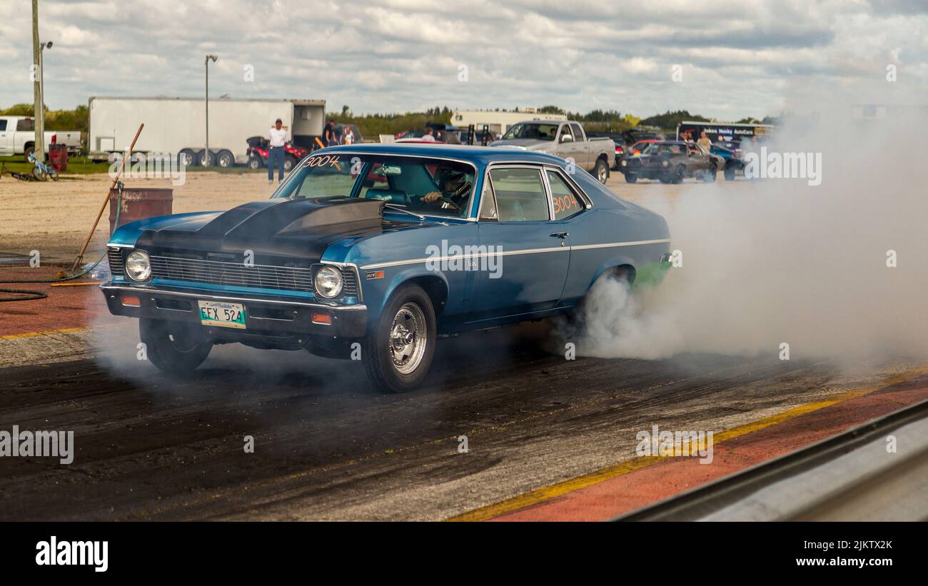 Nova Dragster doing a burnout with smoke before drag race. Burnout at ...