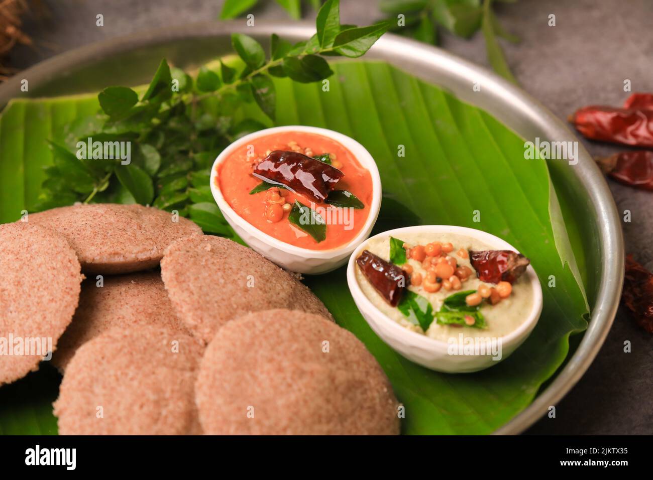 south indian breakfast idly served with two chutne Stock Photo - Alamy