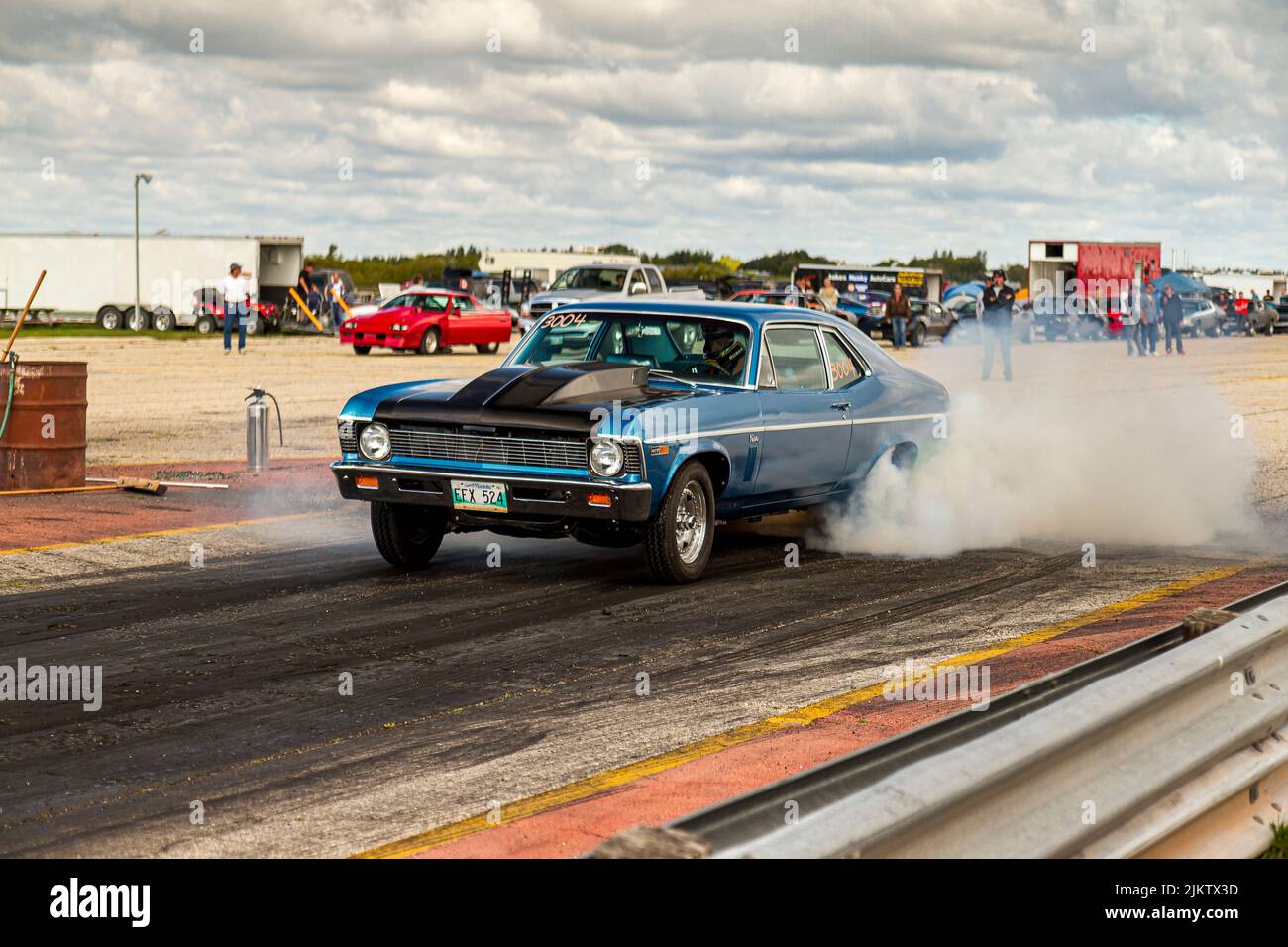 Nova Dragster doing a burnout with smoke before drag race. Burnout at ...
