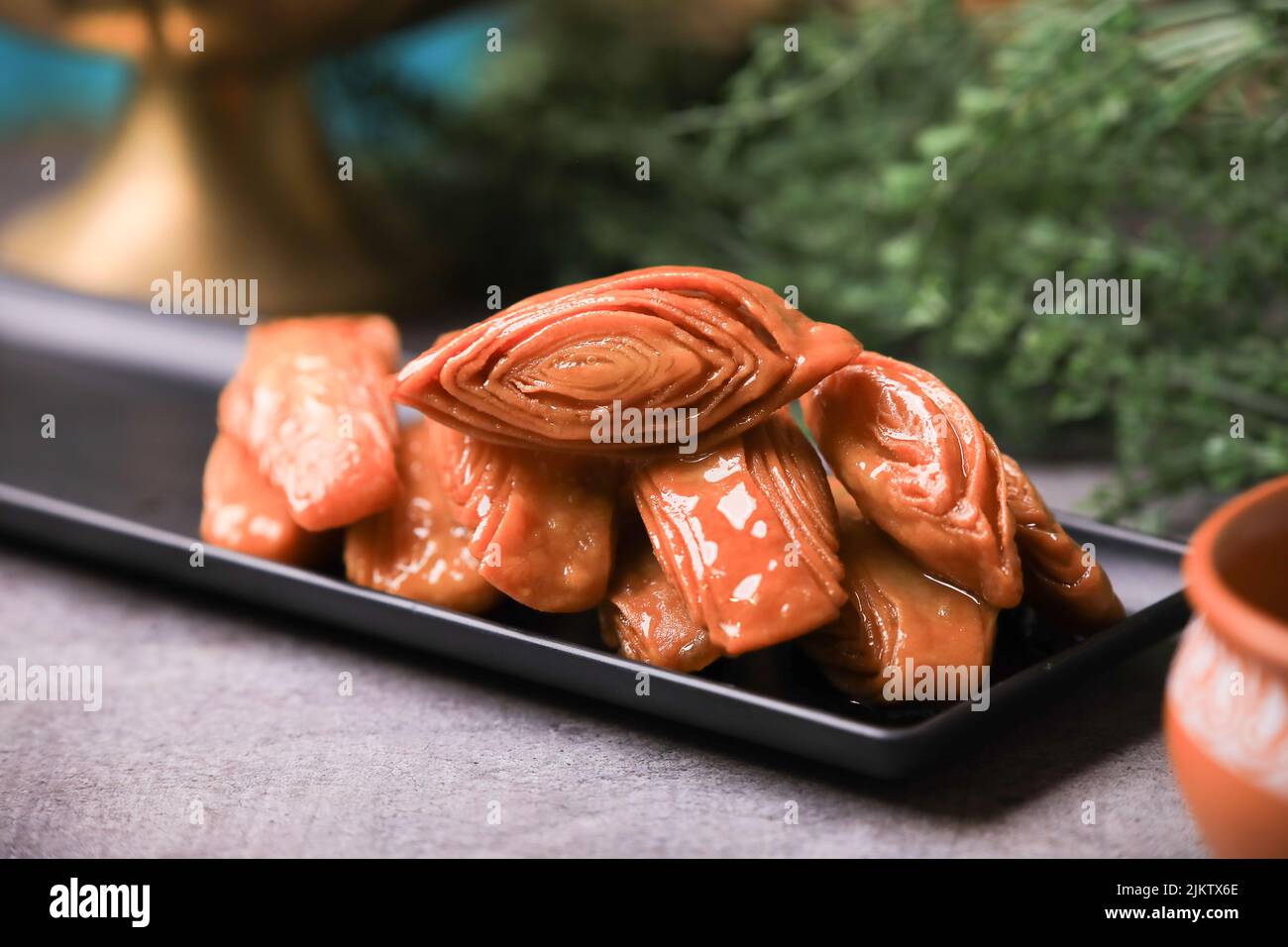 khaja indian famous sweet desert Stock Photo - Alamy