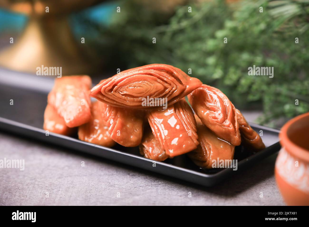 khaja indian famous sweet desert Stock Photo - Alamy