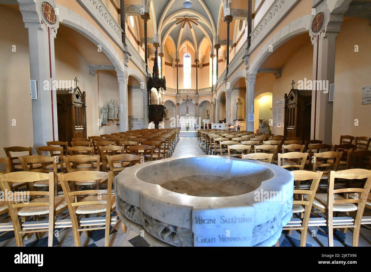 Interior of the Chapel Notre dame de Pipet with the holy water stoup in ...