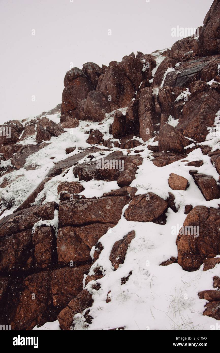 Snow covered rock wall hi-res stock photography and images - Alamy