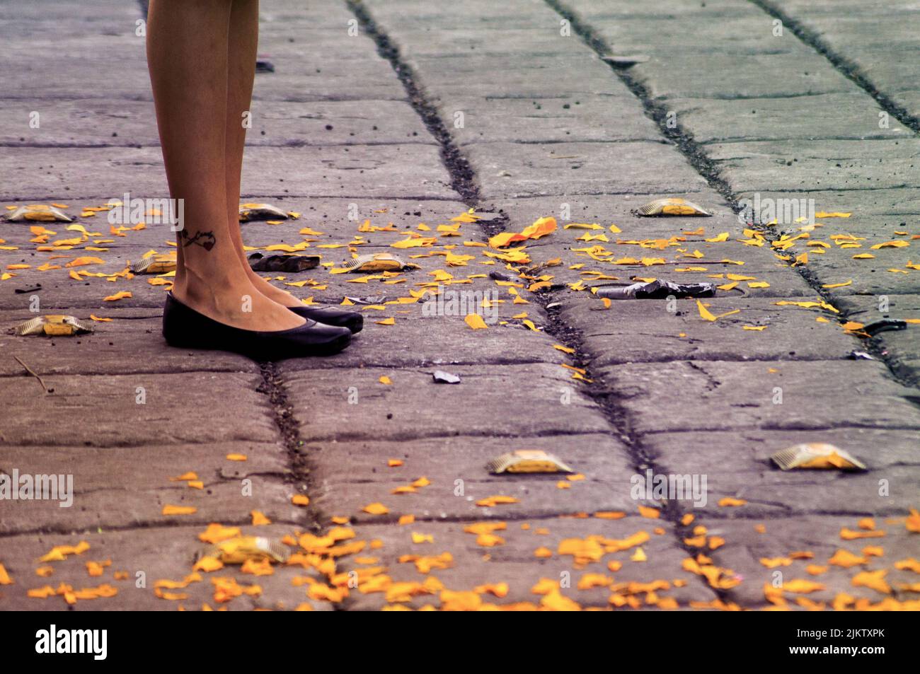 A selective of female legs on a cobblestone Stock Photo - Alamy