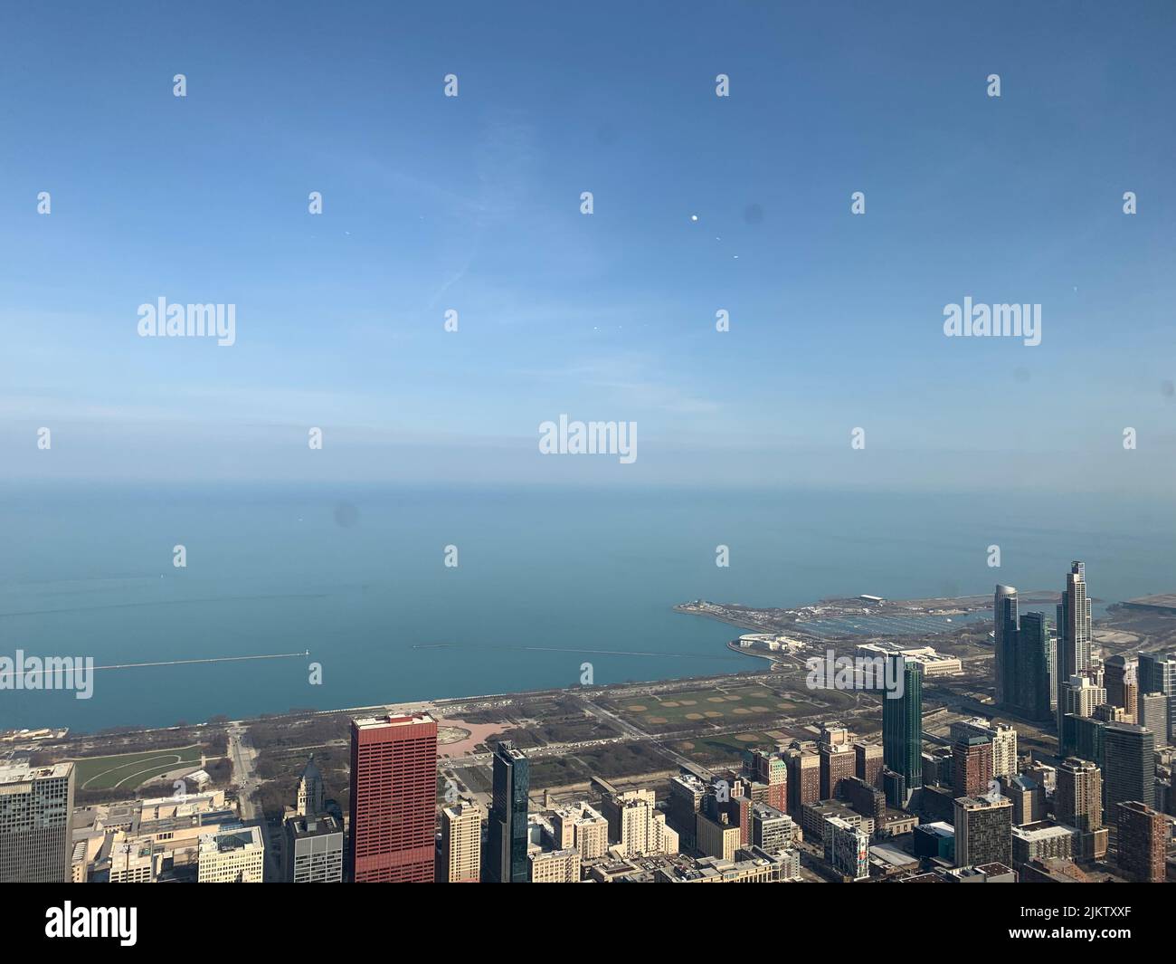 An aerial city view from Skydeck of buildings in Chicago with lake ...