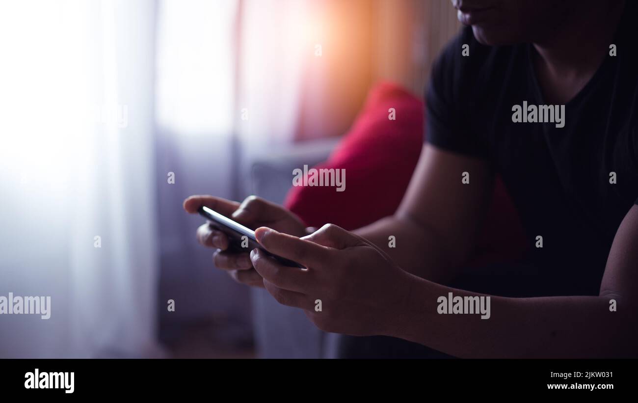 Handsome african man texting phone hi-res stock photography and images ...