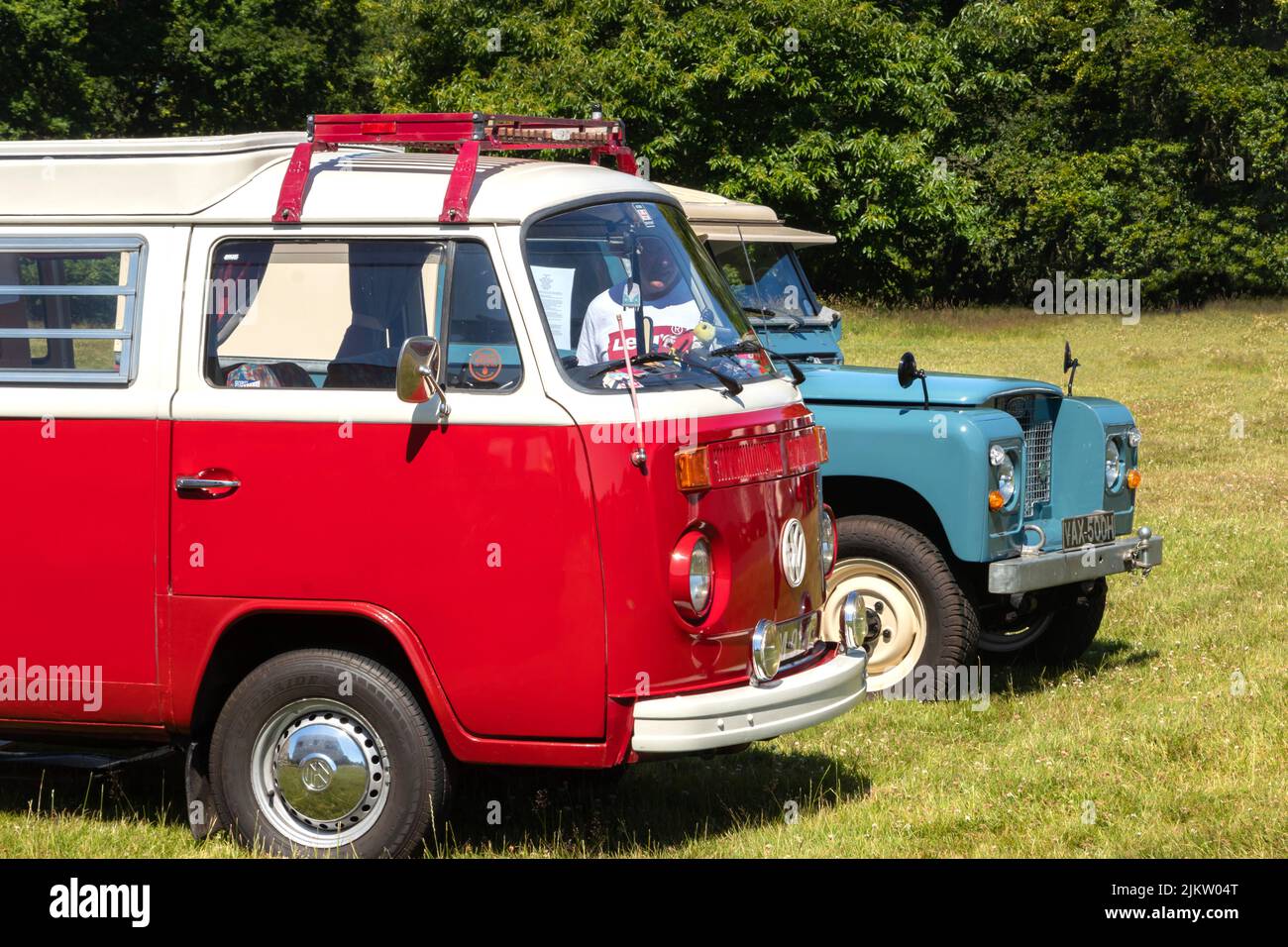 red and white vintage VW Volkswagen Type 2 transporter Kombi or ...