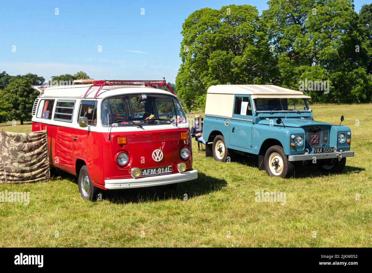 red and white vintage VW Volkswagen Type 2 transporter Kombi or ...