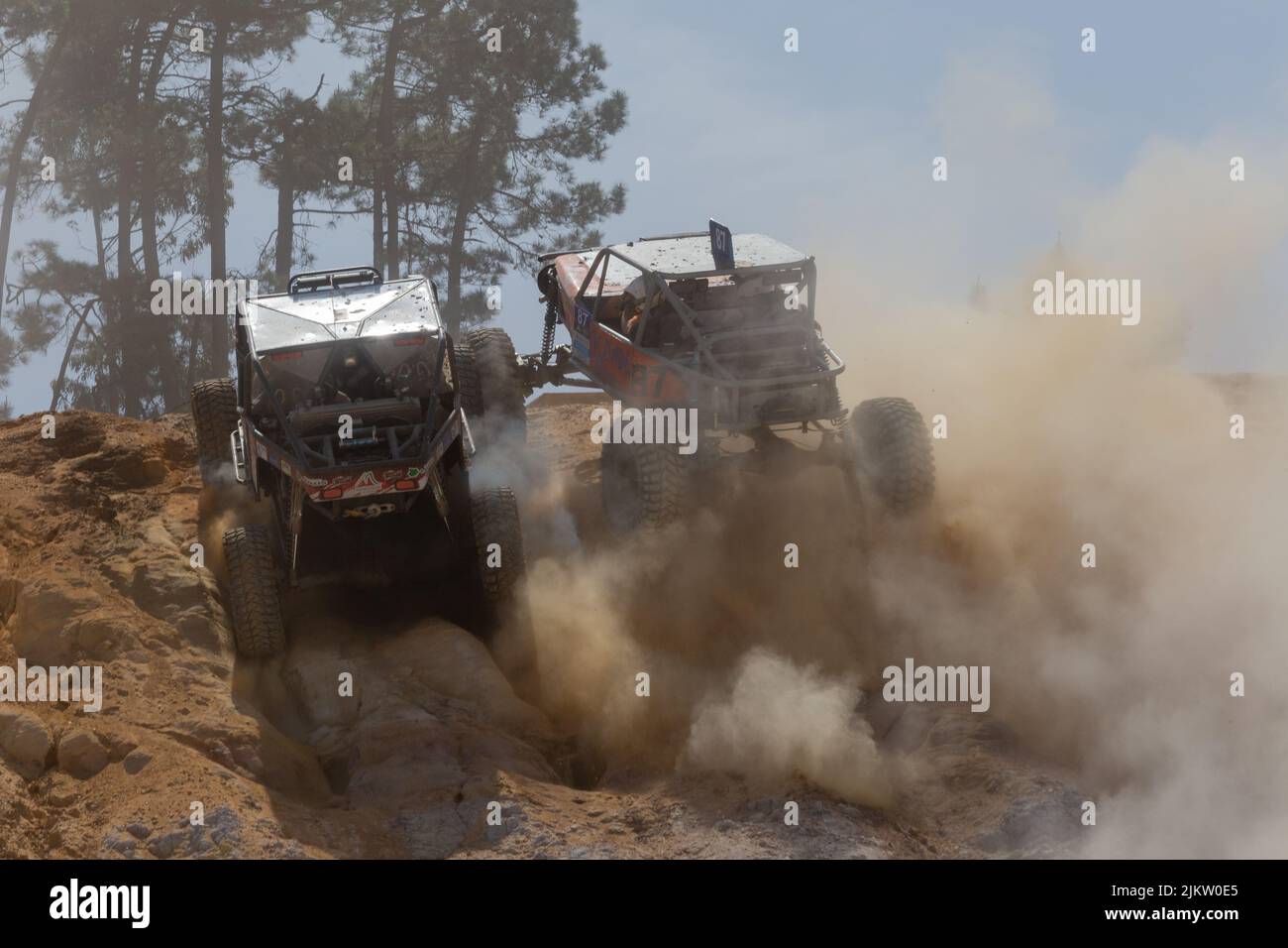 An off-road racing car covered with mud during National All Terrain ...