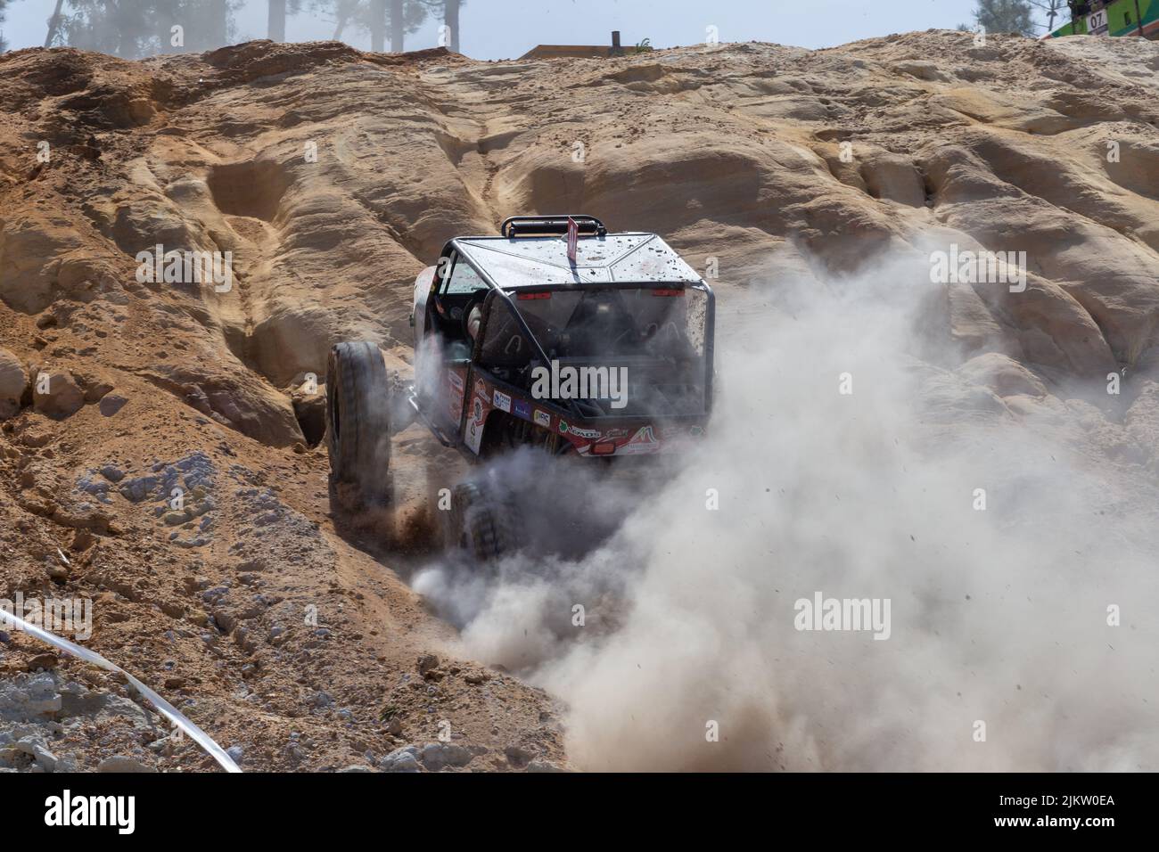 An Off-road racing car covered with mud during National All Terrain ...