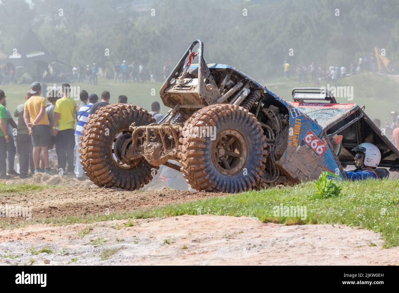 An Off-road racing car covered with mud during National All Terrain ...
