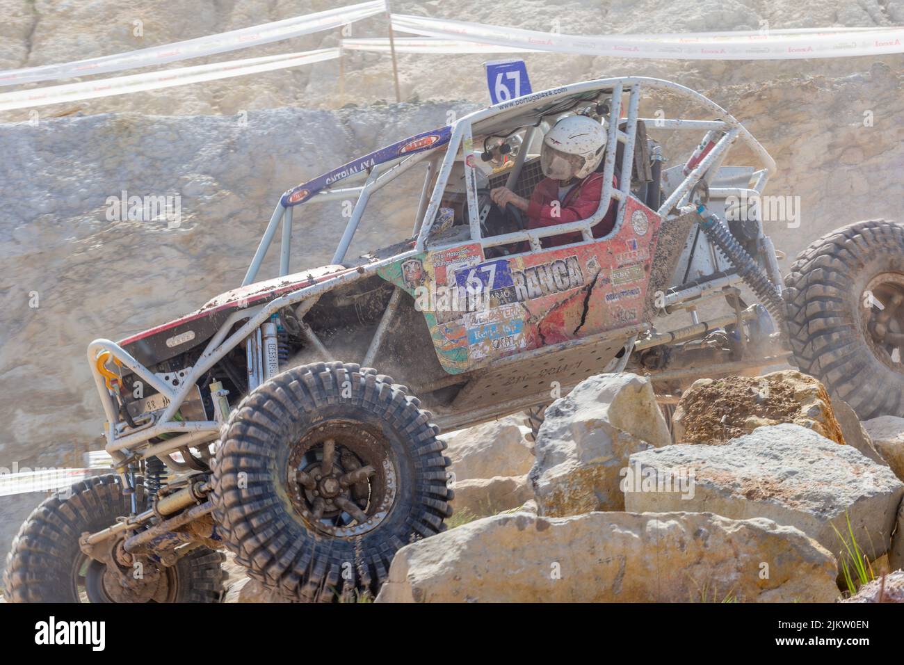 An Off-road racing car covered with mud during National All Terrain ...