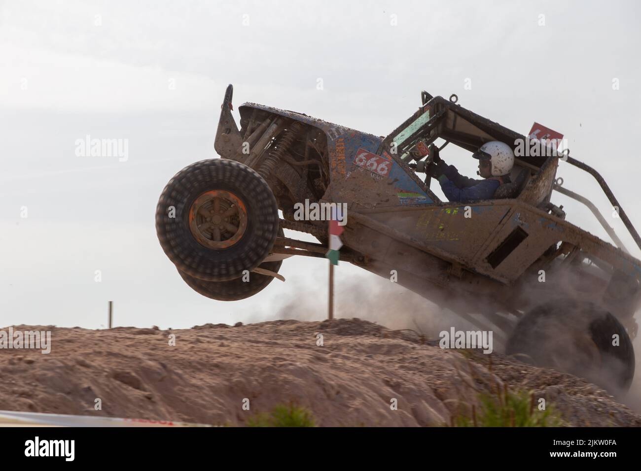 An Off-road racing car covered with mud during National All Terrain ...