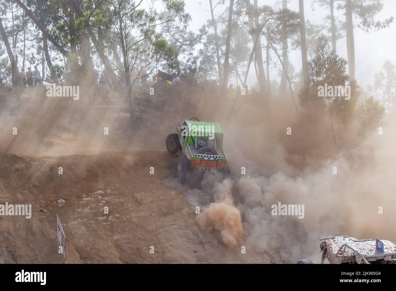 An Off-road racing car covered with mud during National All Terrain ...
