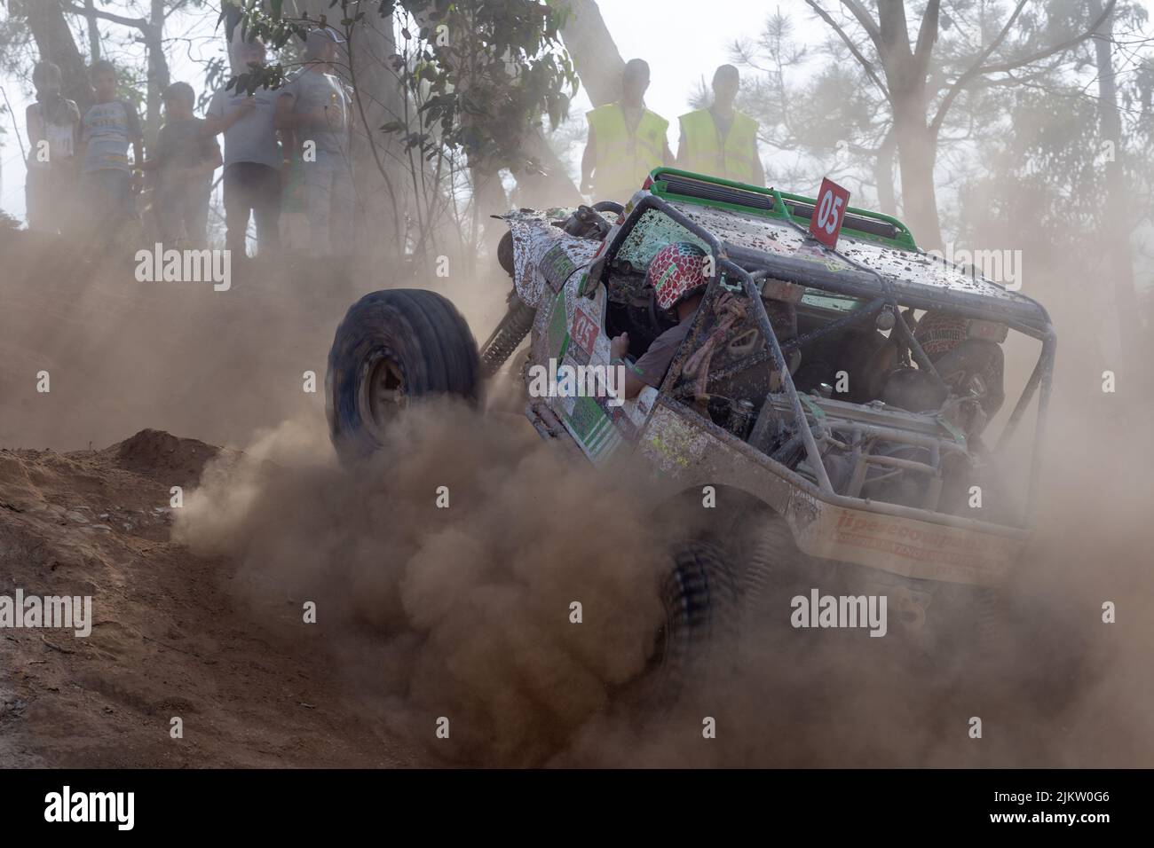 A Off-road racing car covered with mud during National All Terrain ...
