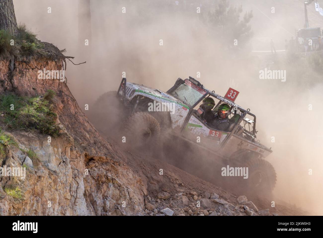 An off-road racing car covered with mud during National All Terrain ...