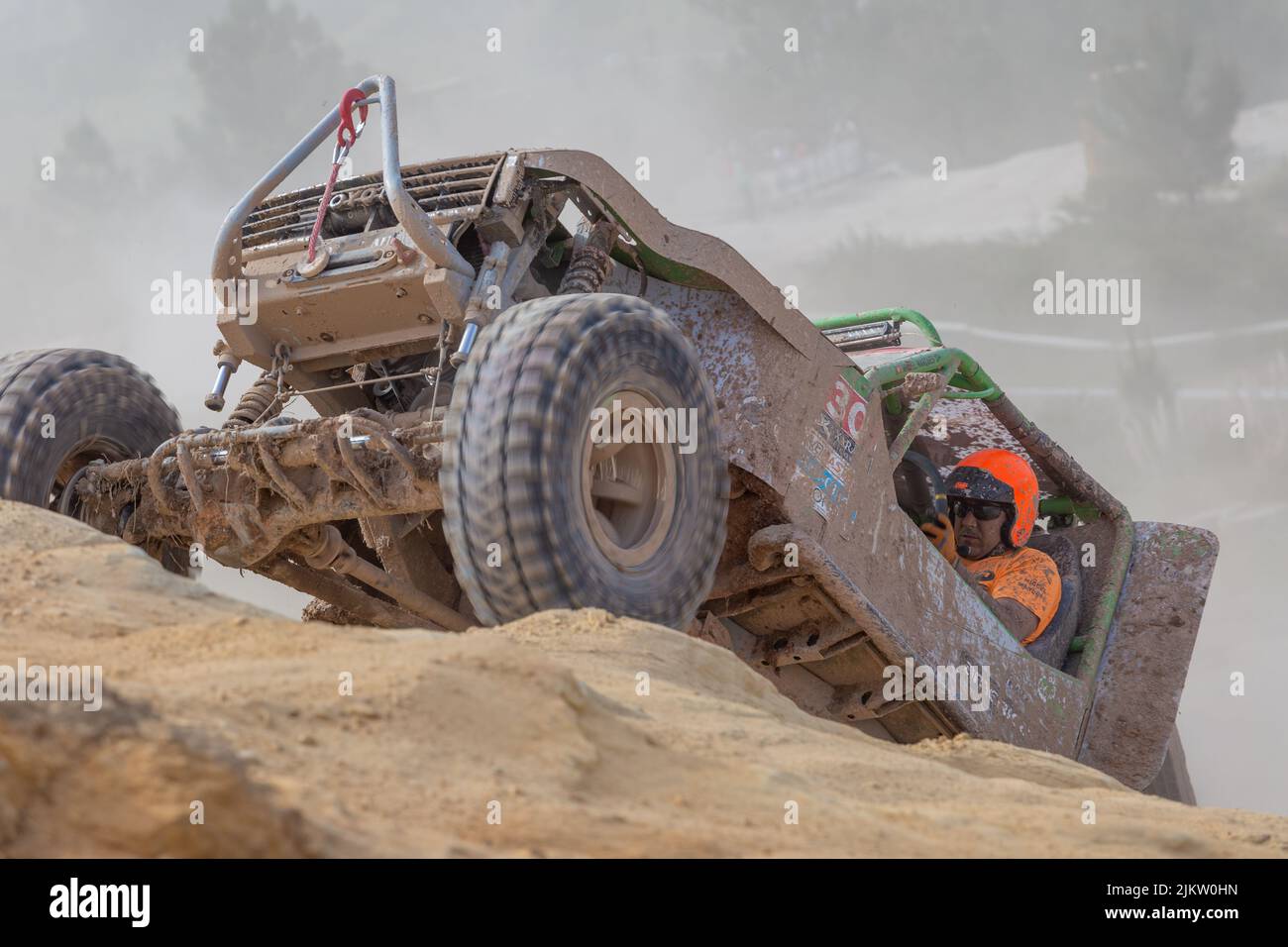 An Off-road racing car covered with mud during National All Terrain ...
